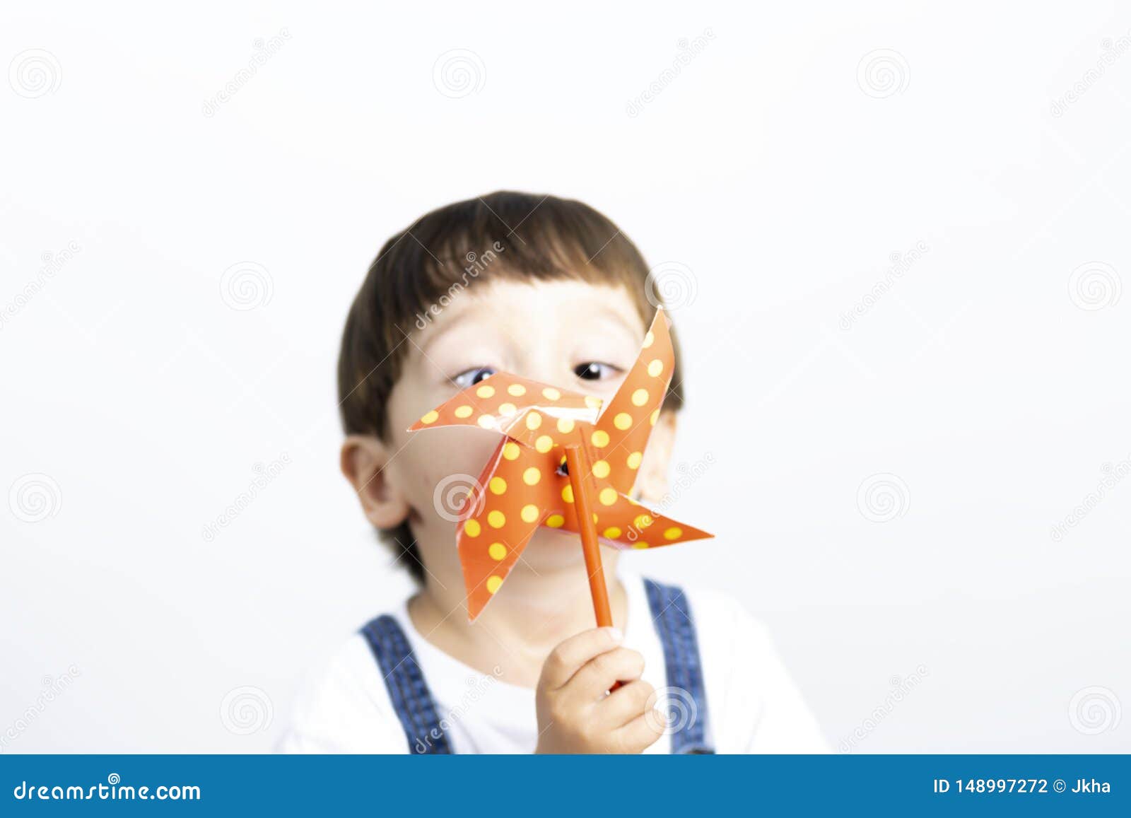 Happy Boy Playing with Pinwheel Stock Photo - Image of preschooler ...