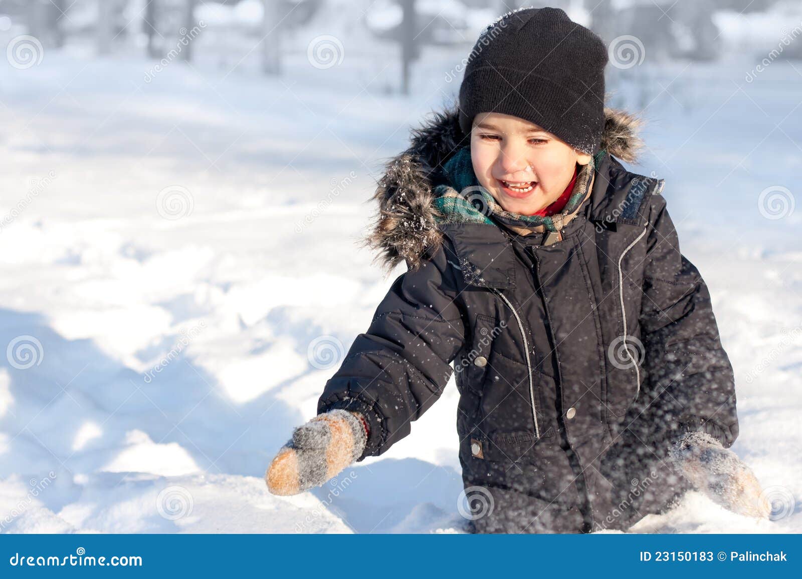Happy boy playing in snow stock image. Image of excited - 23150183