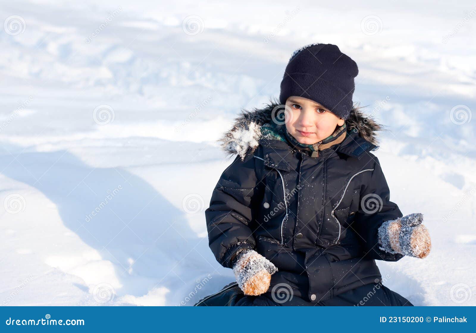 Happy boy playing in snow stock photo. Image of excitement - 23150200