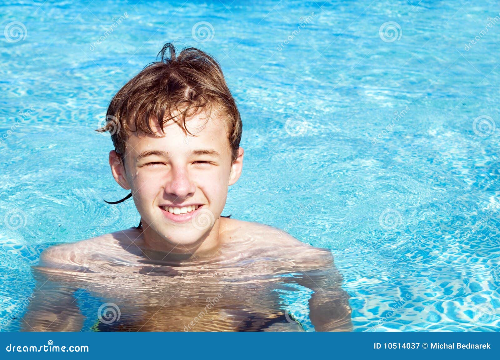 Happy boy in a pool stock image. Image of childhood, sport - 10514037