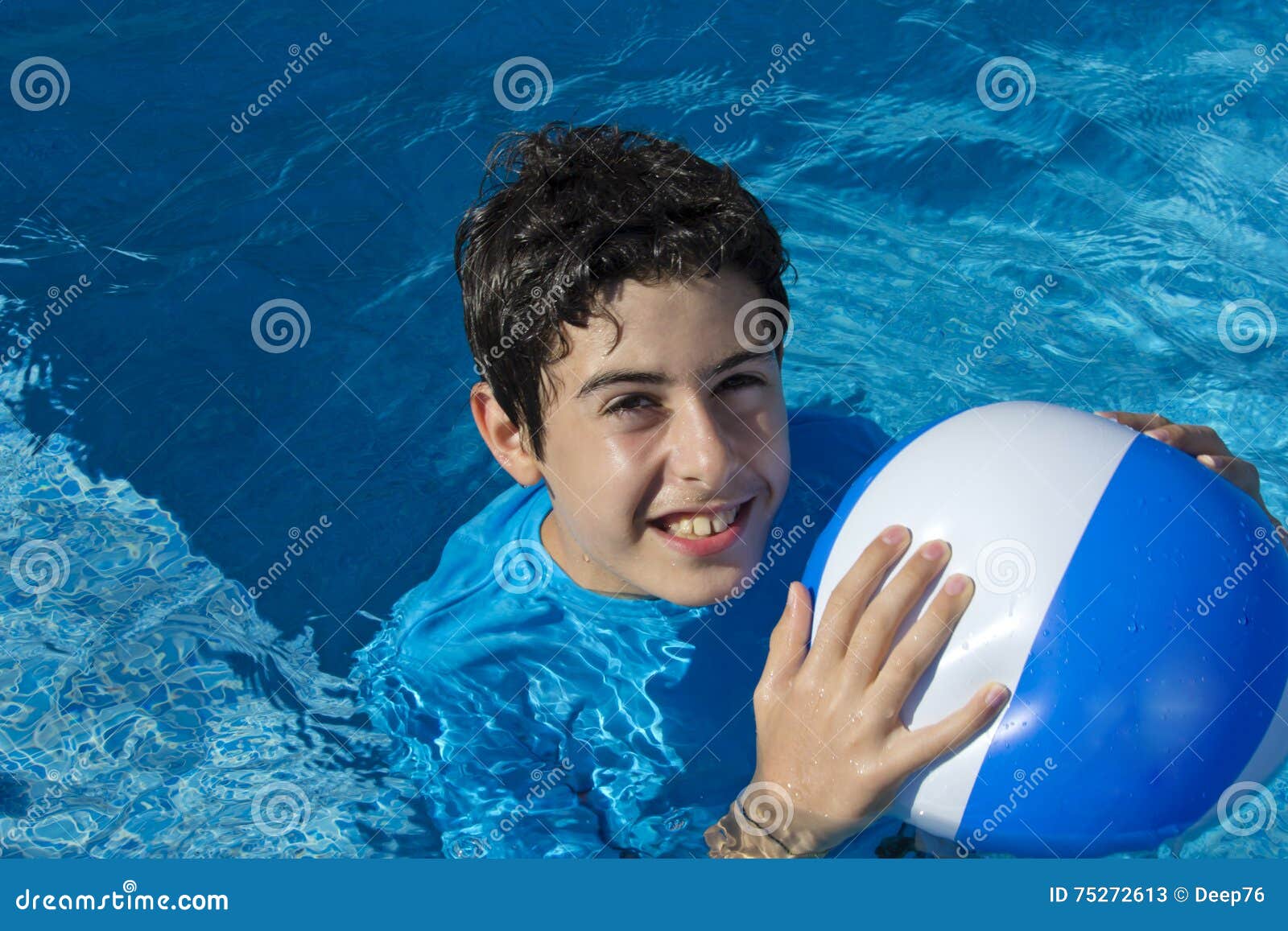 Happy boy in the pool stock image. Image of sunny, blue - 75272613