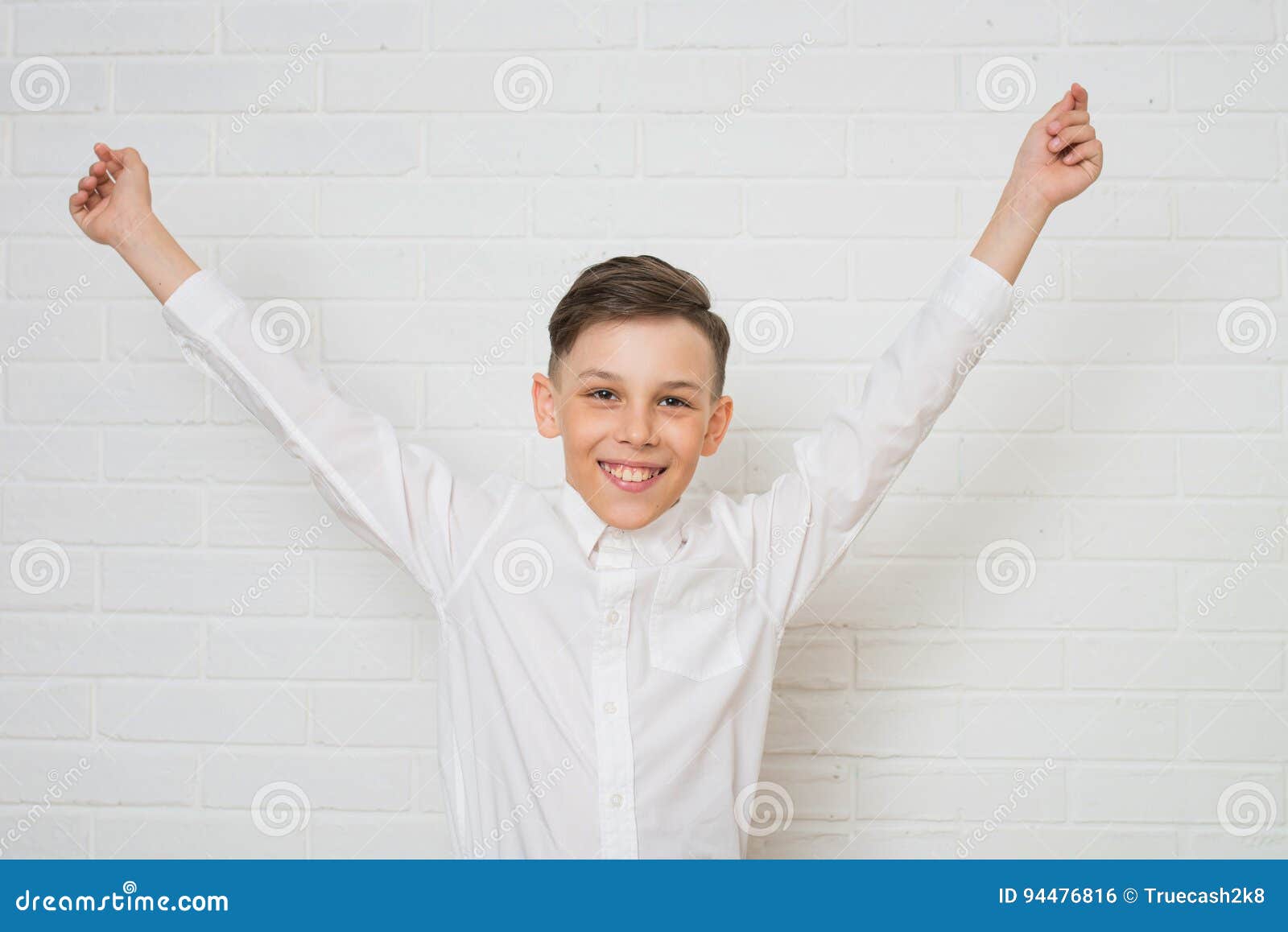 Happy Boy with Raised Hands Up Celebrating Victory. Stock Photo - Image ...