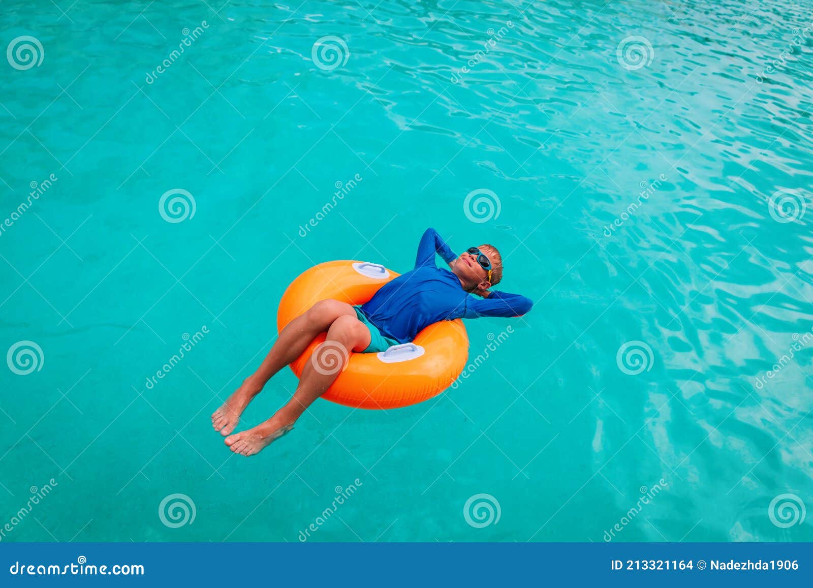 Happy Boy Relax on Floatie in Pool Stock Photo - Image of maldives ...