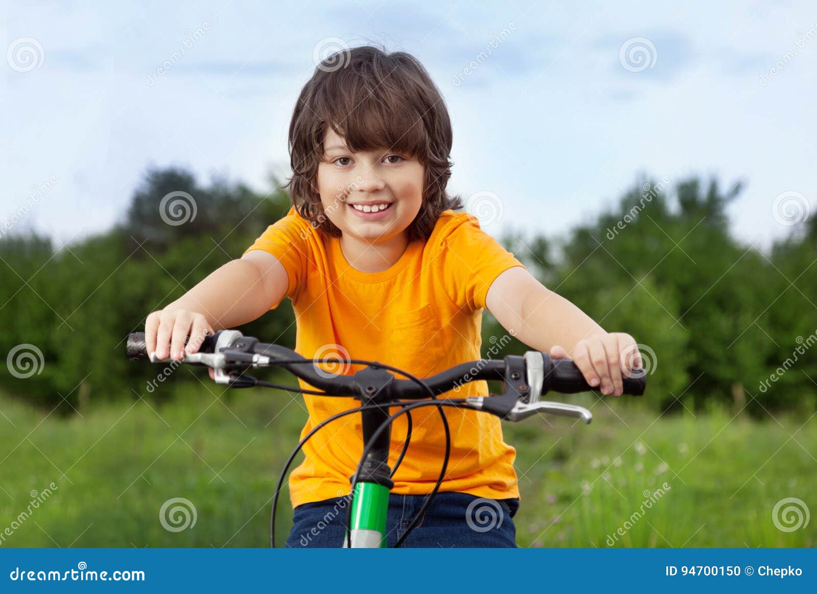 Happy Boy Ride Bikes Outdoors Stock Photo - Image of looking, enjoyment ...