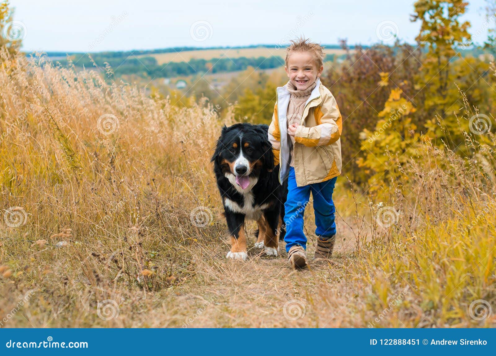 Happy Boy Runs Around with Big Dog on Autumn Hills of Race Stock Image ... Happy Boy Runs Around with Big Dog on Autumn Hills of Race Stock Image ...