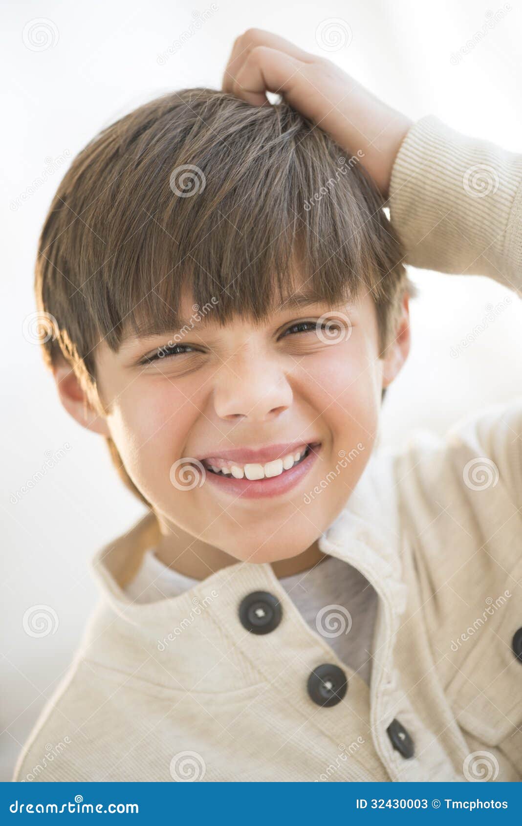 Happy Boy Scratching Head at Home Stock Image - Image of person ...