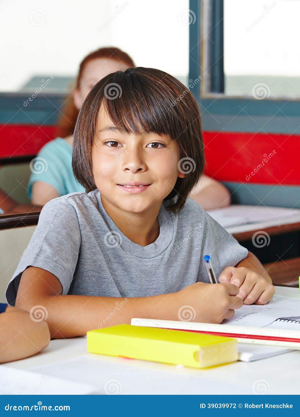 Happy boy sitting in class stock photo. Image of school - 39039972