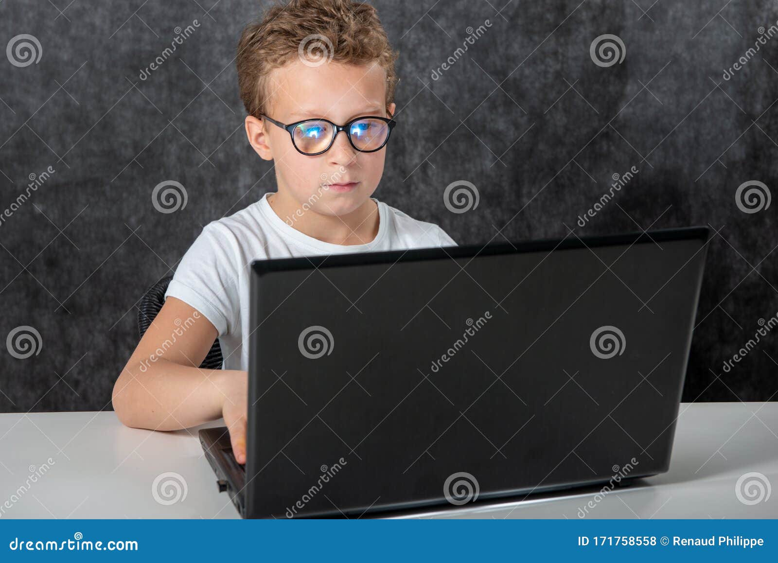 Happy Boy Sitting with Laptop Computer Stock Photo - Image of home ...