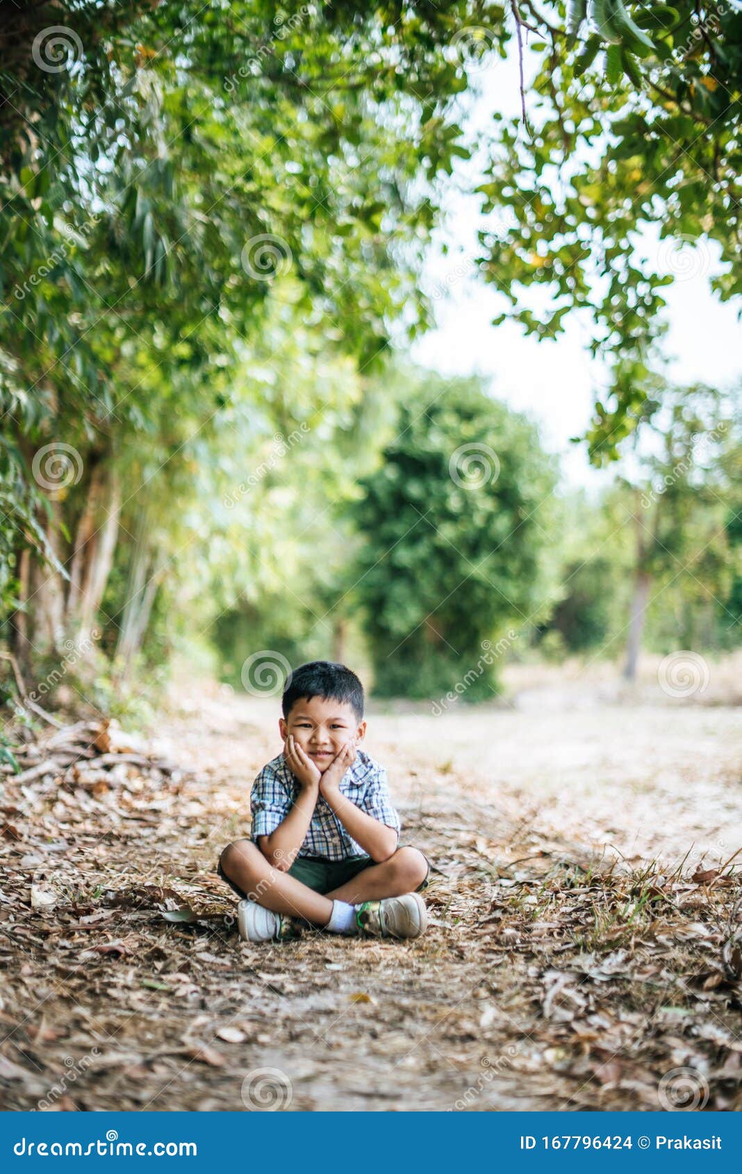 Happy Boy Sitting and Thinking Alone Stock Photo - Image of caucasian ...