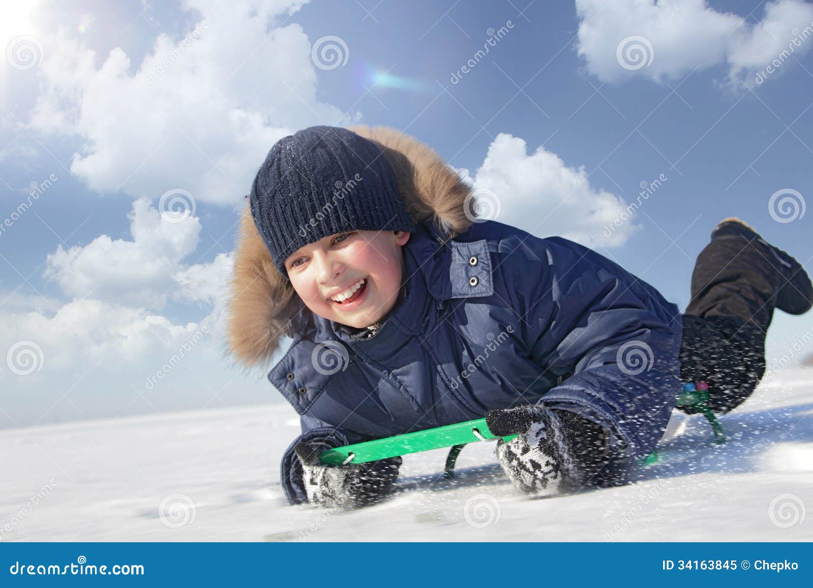 Happy boy on sled stock image. Image of child, enjoyment - 34163845