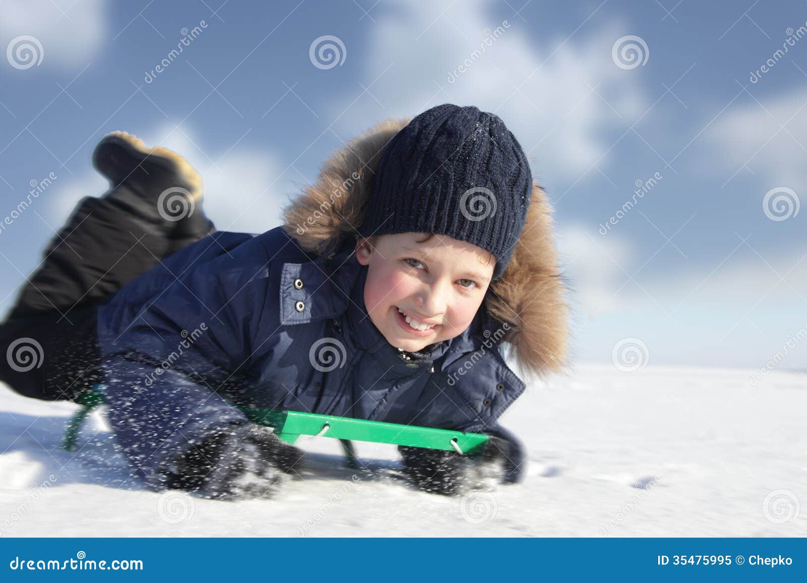Happy boy on sled stock image. Image of outdoors, child - 35475995