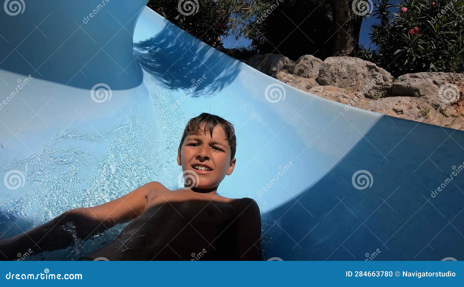 Boy Slides Down on a Blue Water Slide Stock Footage - Video of pool ...