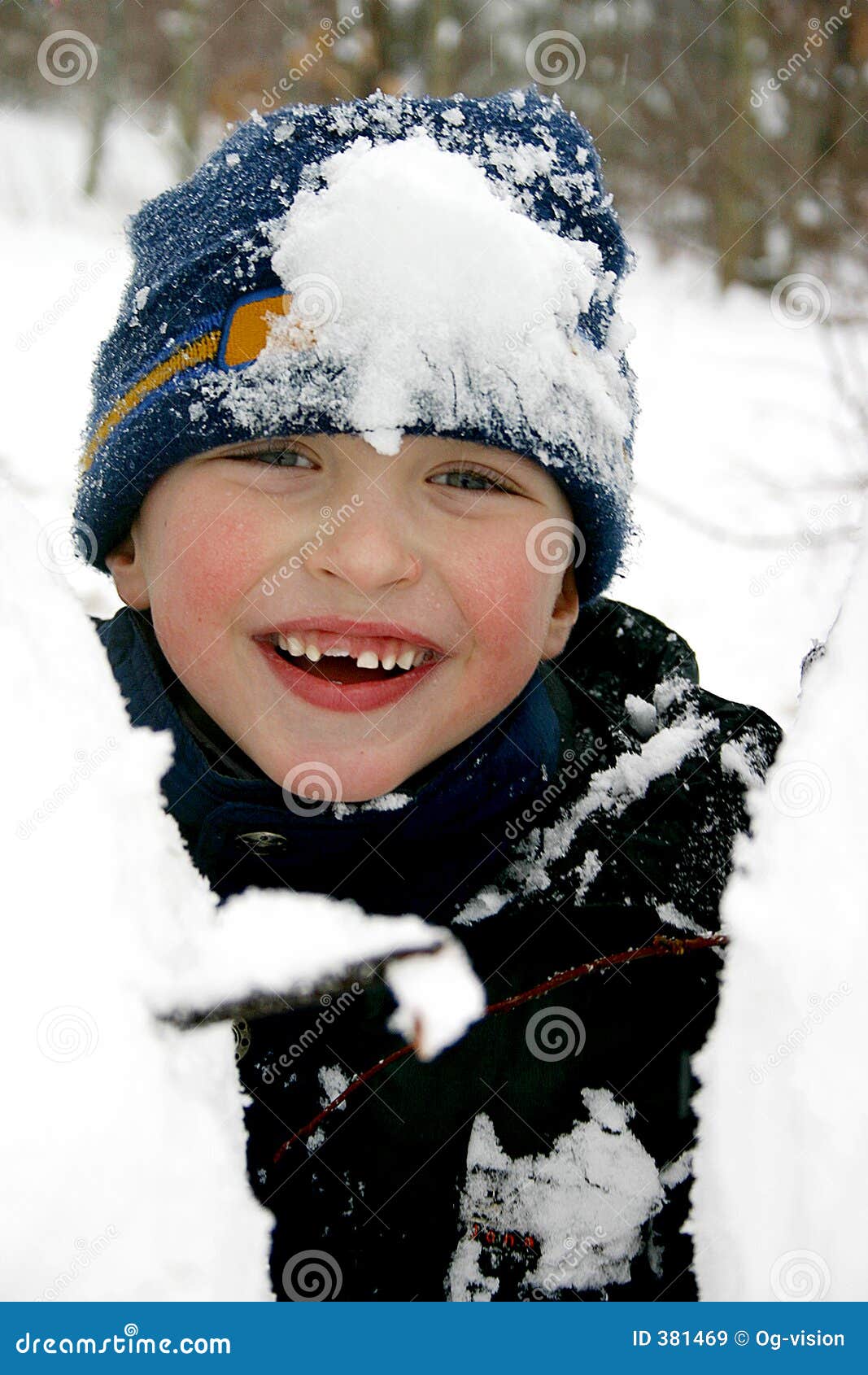 Happy boy on a snow day stock image. Image of joyful, primary - 381469