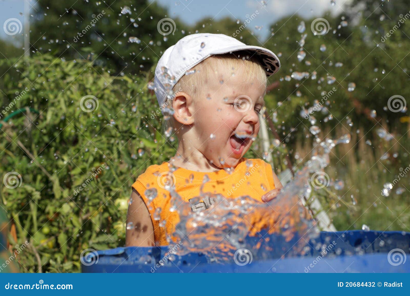 Happy Boy and Splashes of Water Stock Photo - Image of outdoor, happy ...