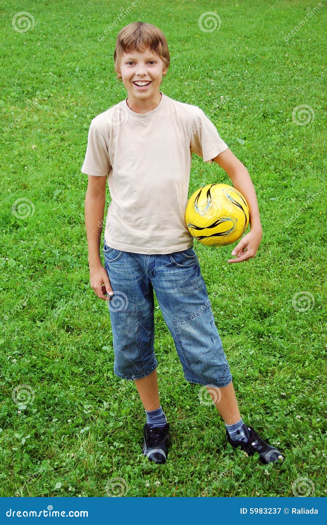 Happy Boy Standing with Ball Stock Image - Image of teen, sport: 5983237