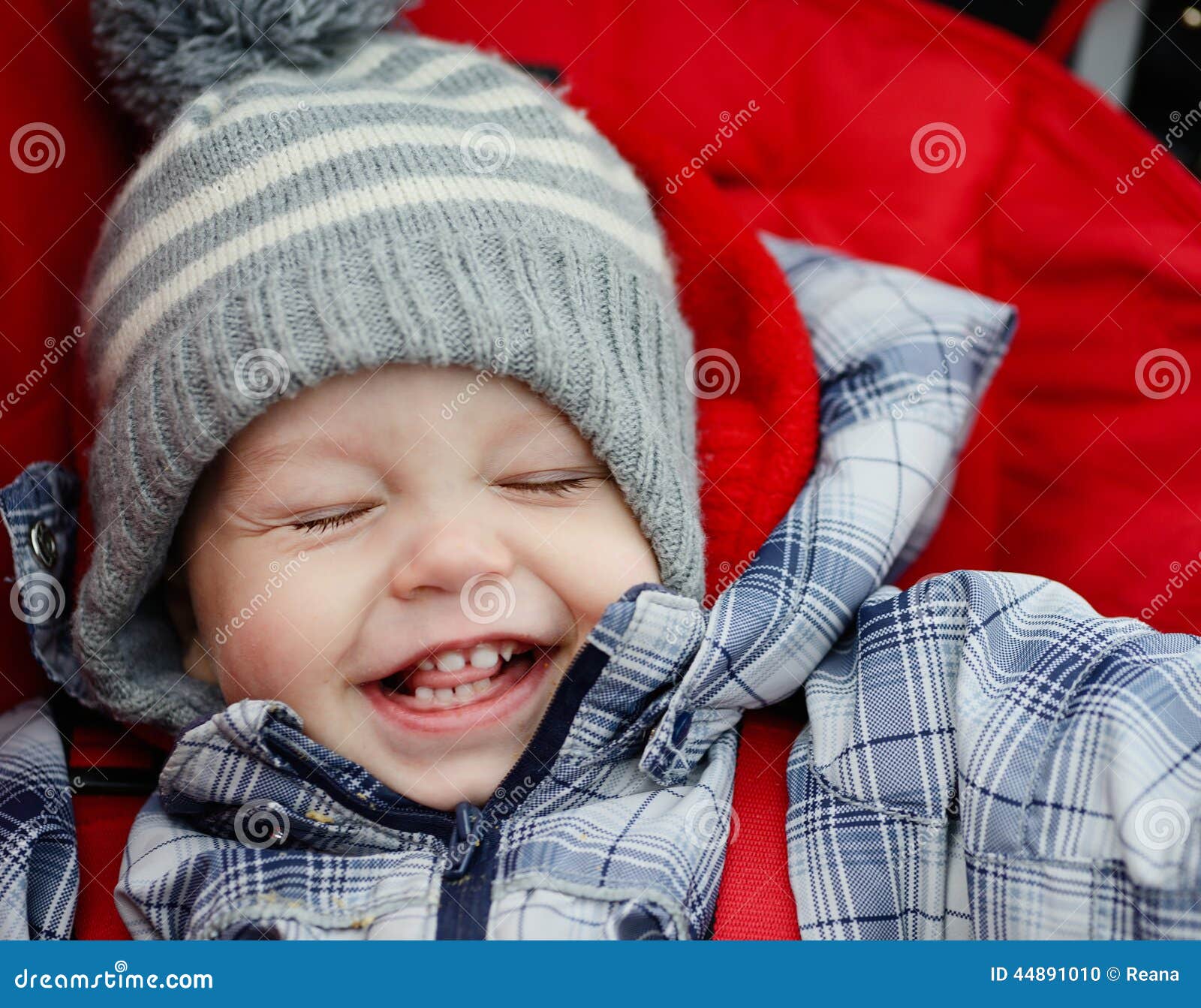 Happy boy in stroller stock photo. Image of comfortable - 44891010