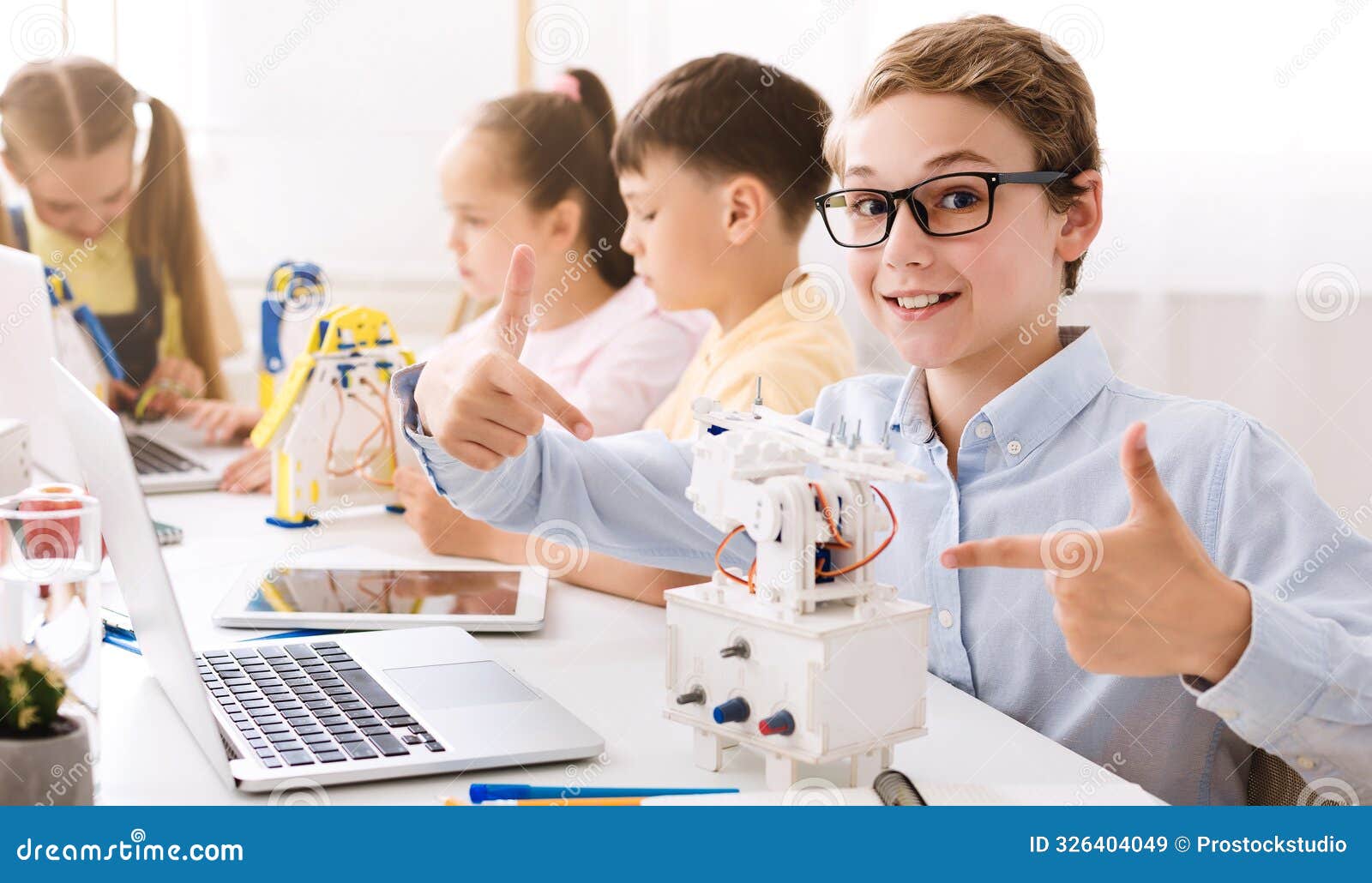 Happy Boy Student Pointing at Robot in Classroom Stock Image - Image of ...