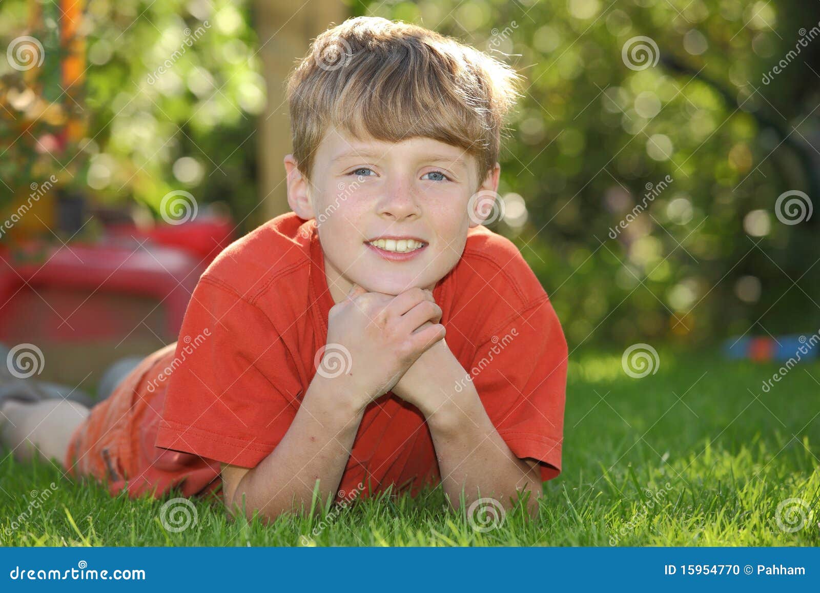 Happy boy in the sun stock photo. Image of landscape - 15954770