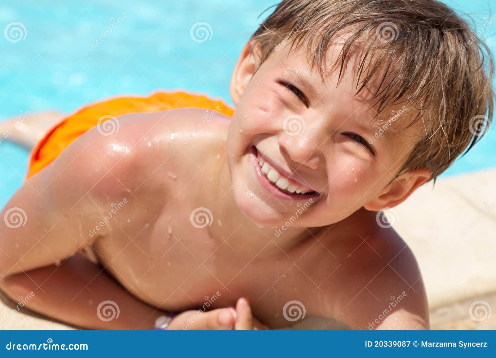 Happy boy in swimming pool stock image. Image of pose - 20339087