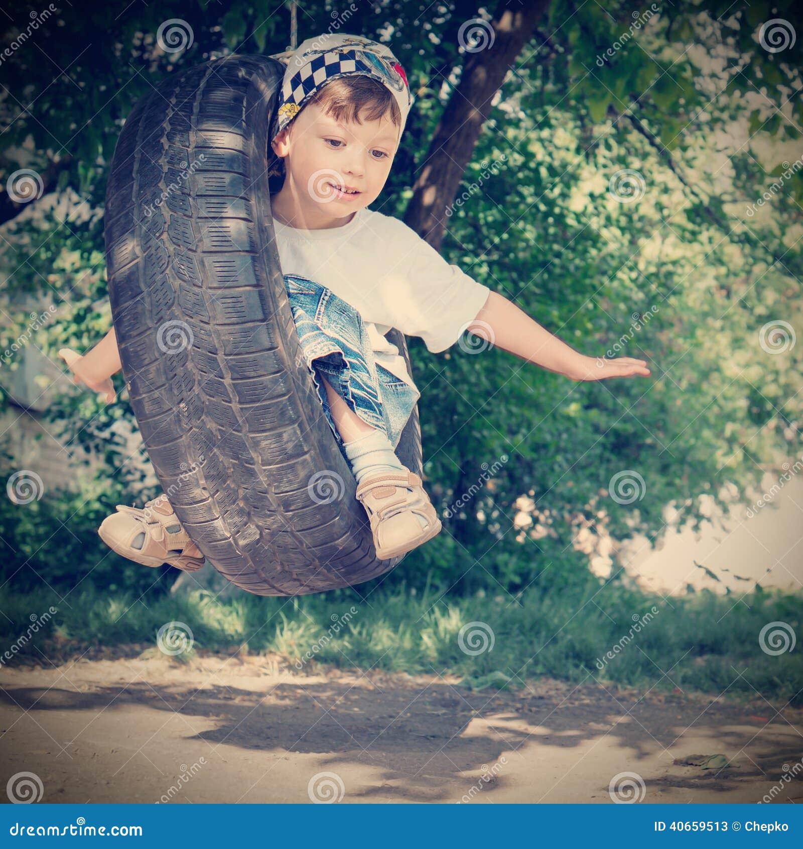 Happy boy on swing stock image. Image of motion, little - 40659513