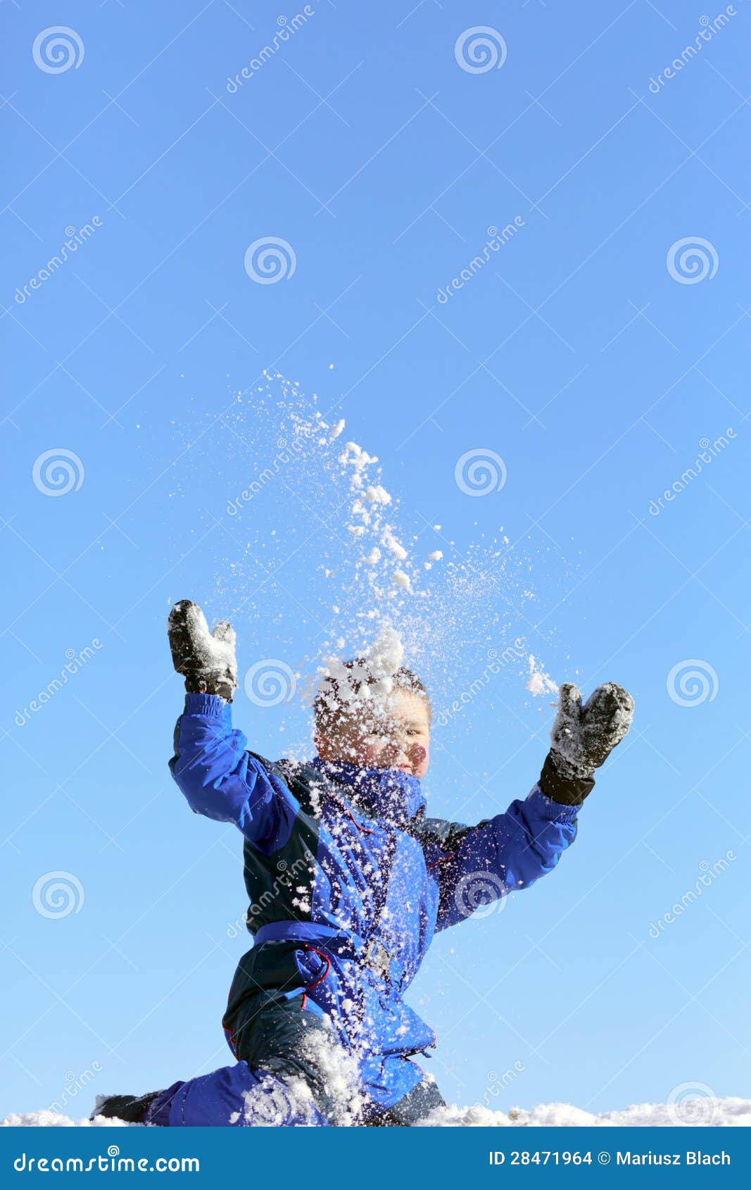 Happy boy throwing snow stock photo. Image of childhood - 28471964