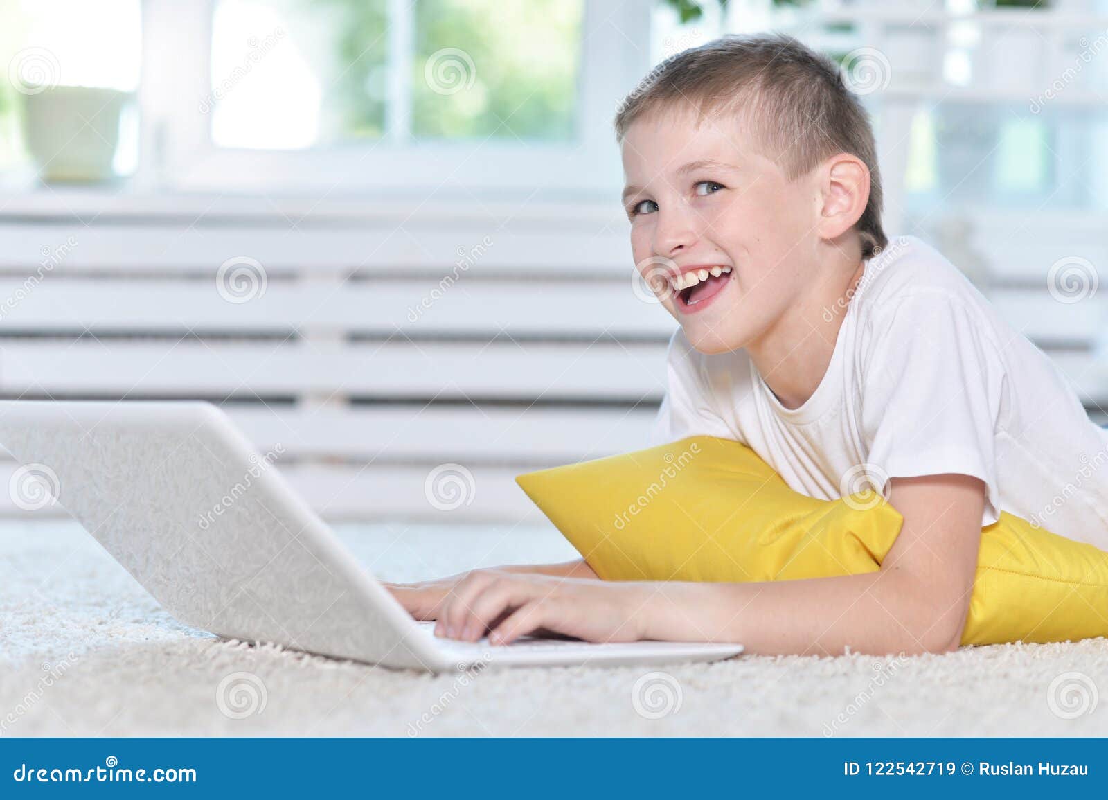 Young Boy and Laptop Computer Stock Image - Image of lying, online ...