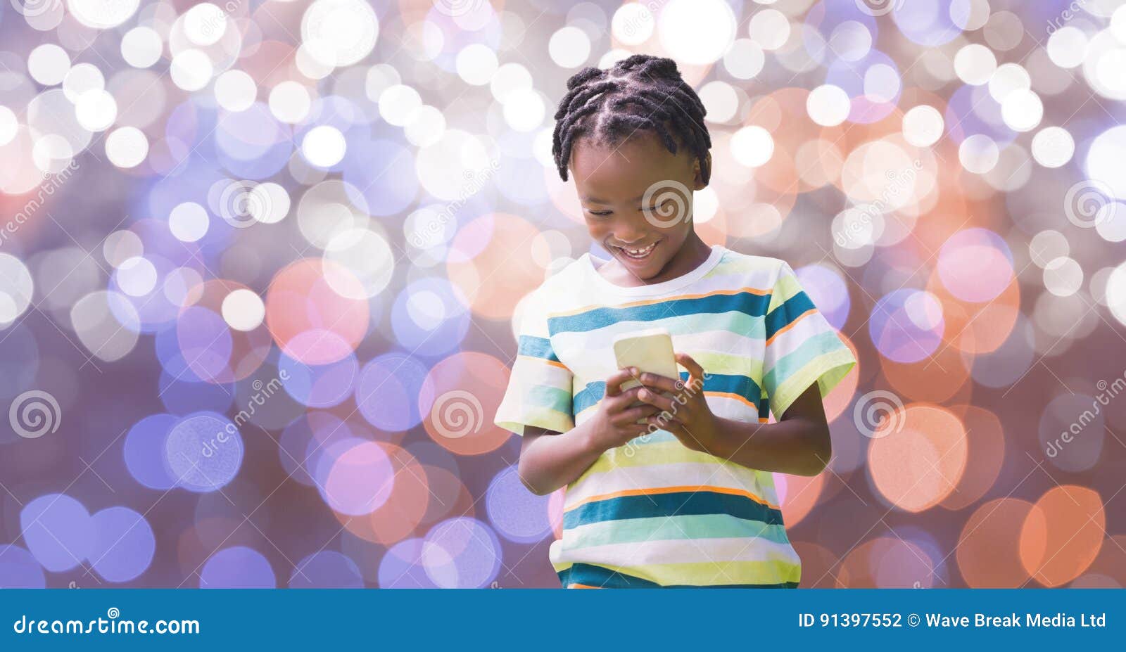 Happy Boy Using Smart Phone Over Bokeh Stock Photo - Image of design ...