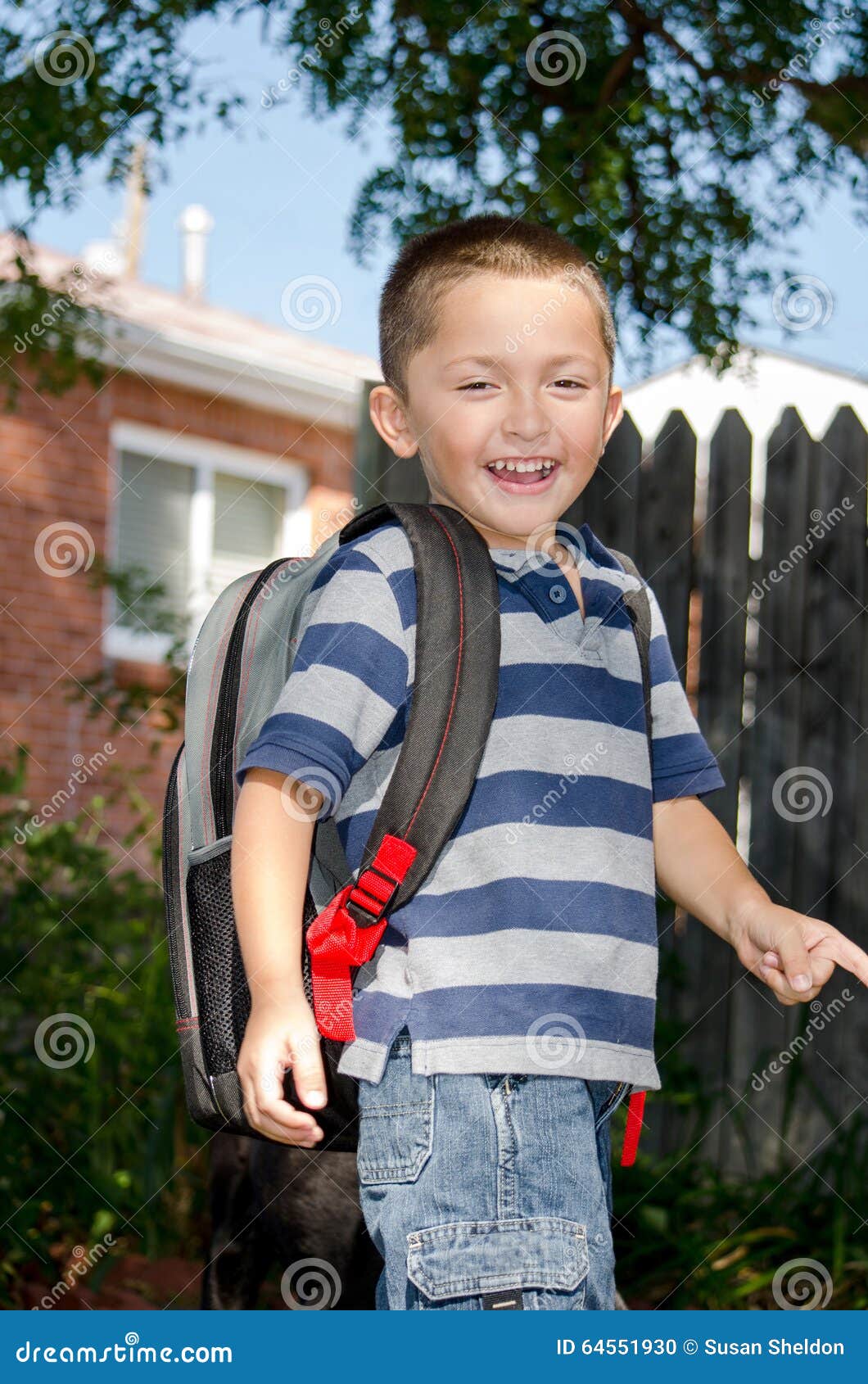 A Happy Boy Walking To School Stock Photo - Image of smile, portrait ...