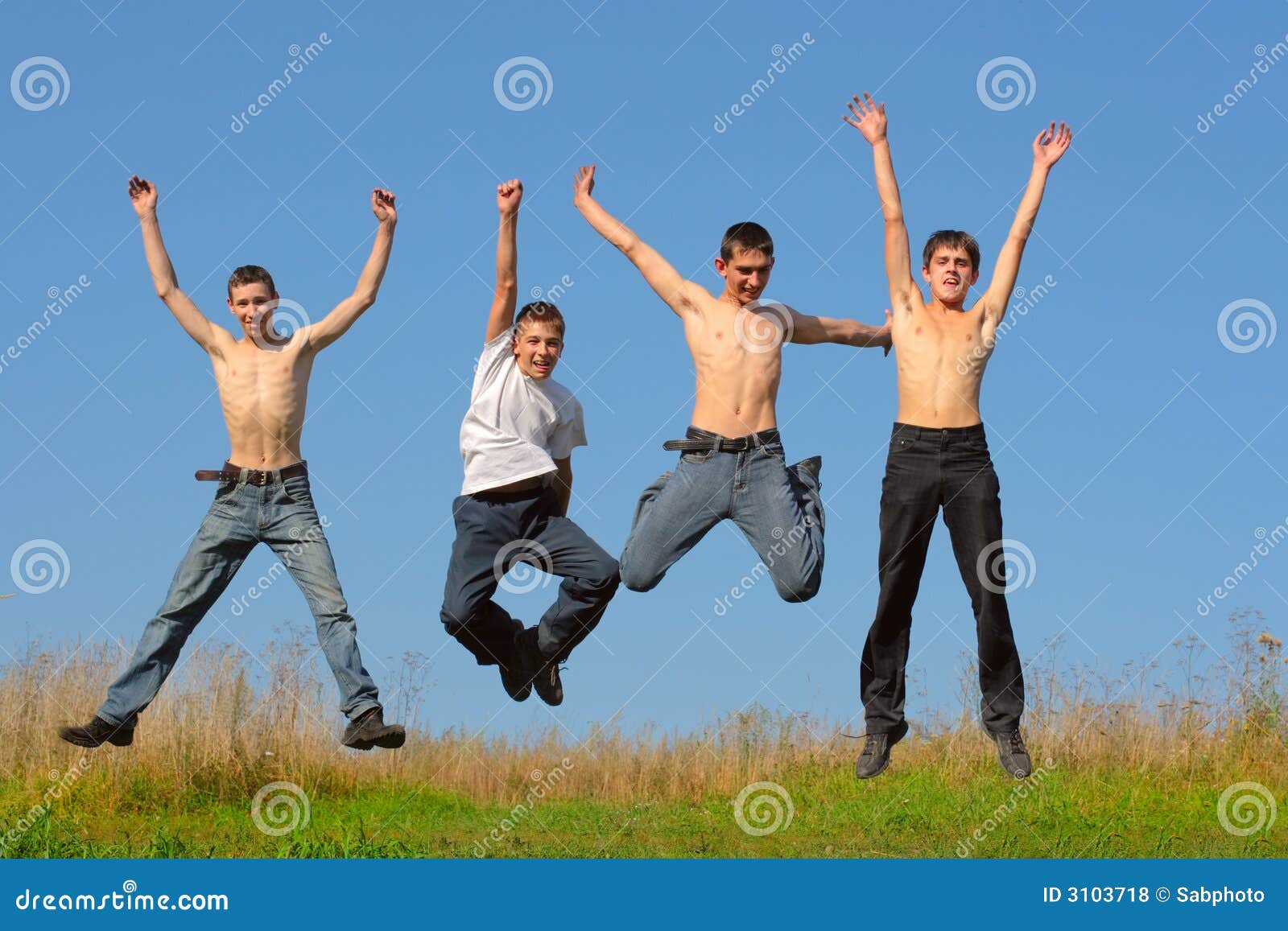 Happy boys jumping stock photo. Image of cheerful, ecstatic - 3103718
