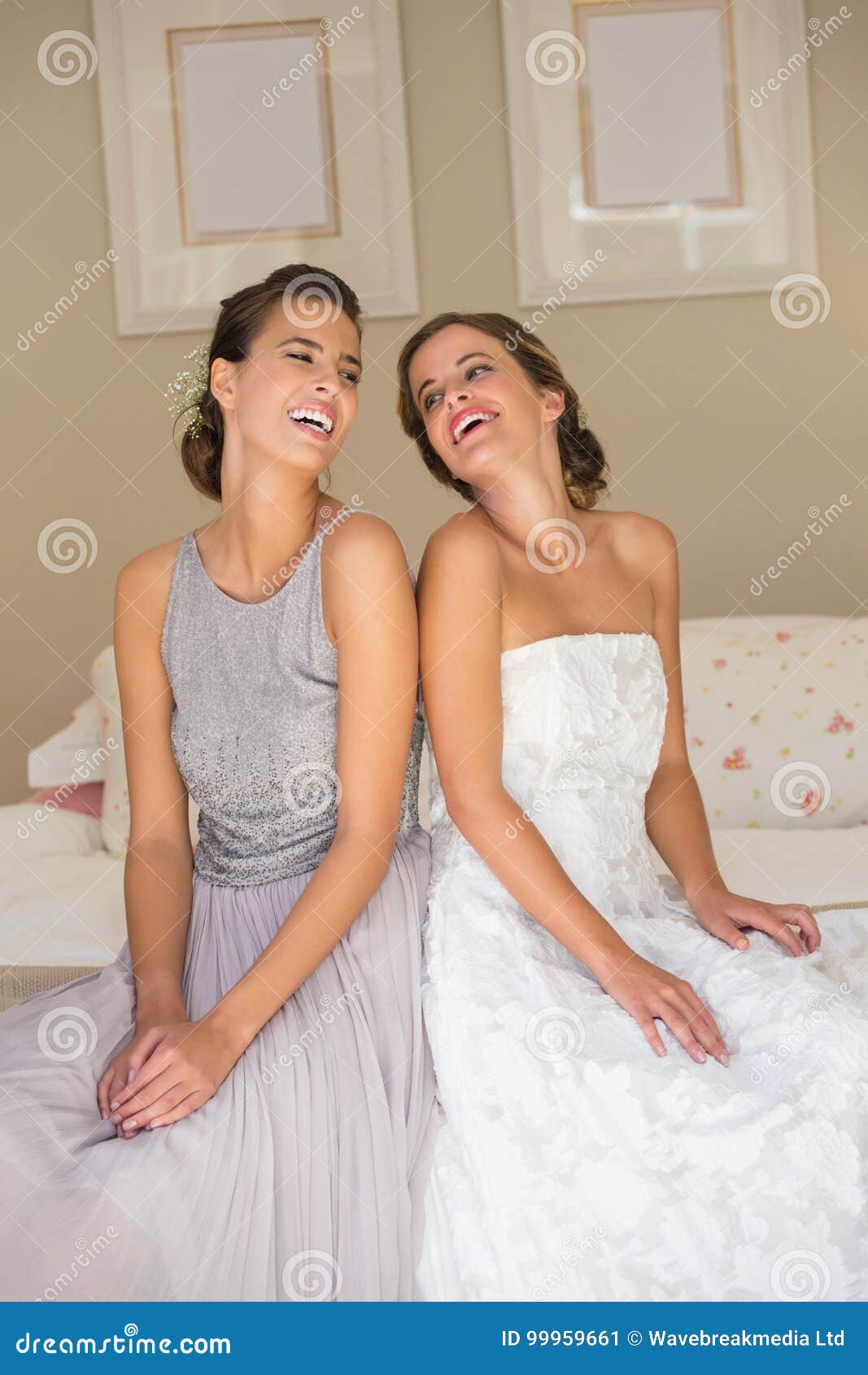 Happy Bride with Bridesmaid Sitting on Bed Stock Image - Image of happy ...