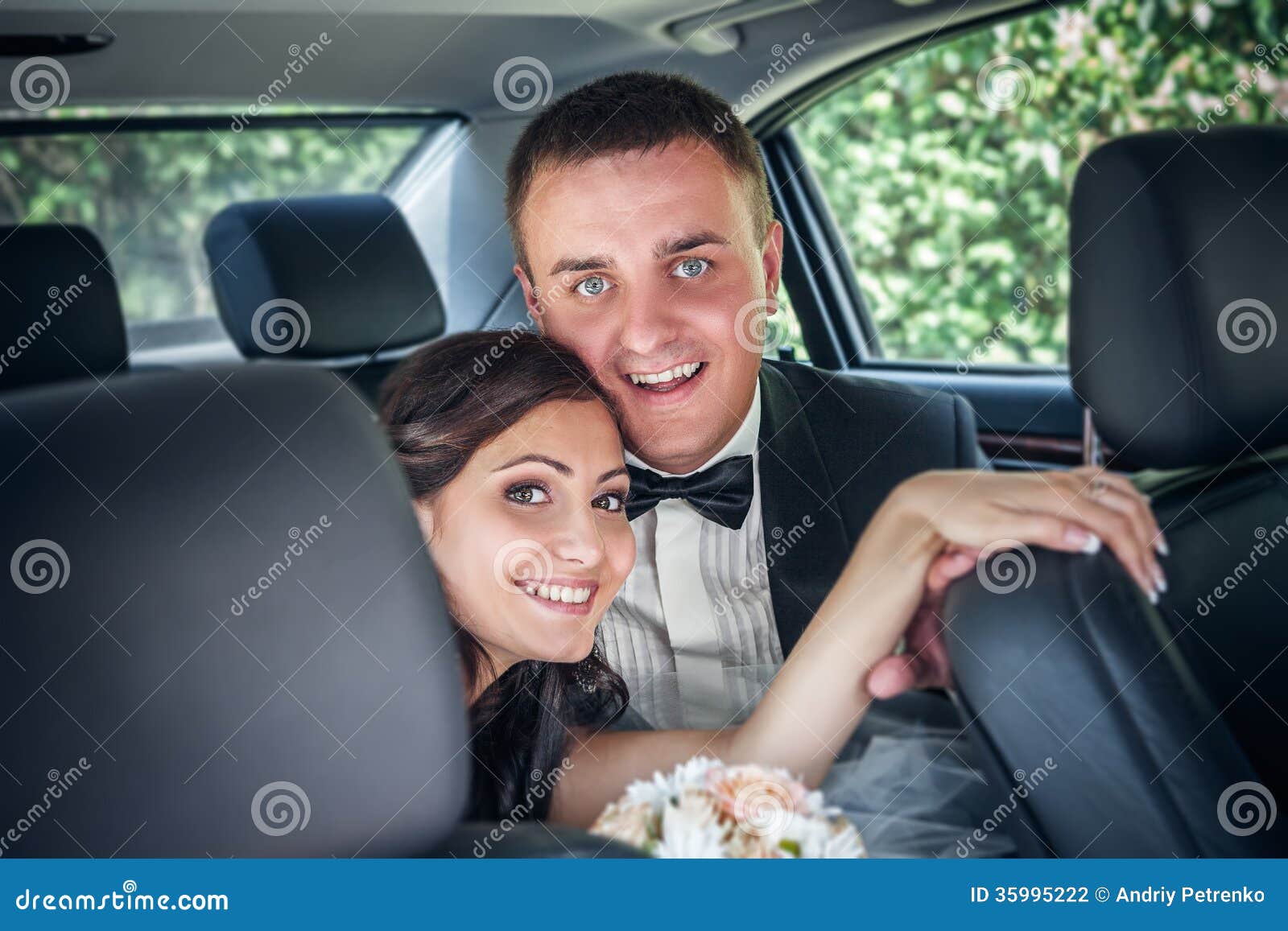 Happy Bride and Groom in the Car Stock Photo - Image of limo, newlywed ...