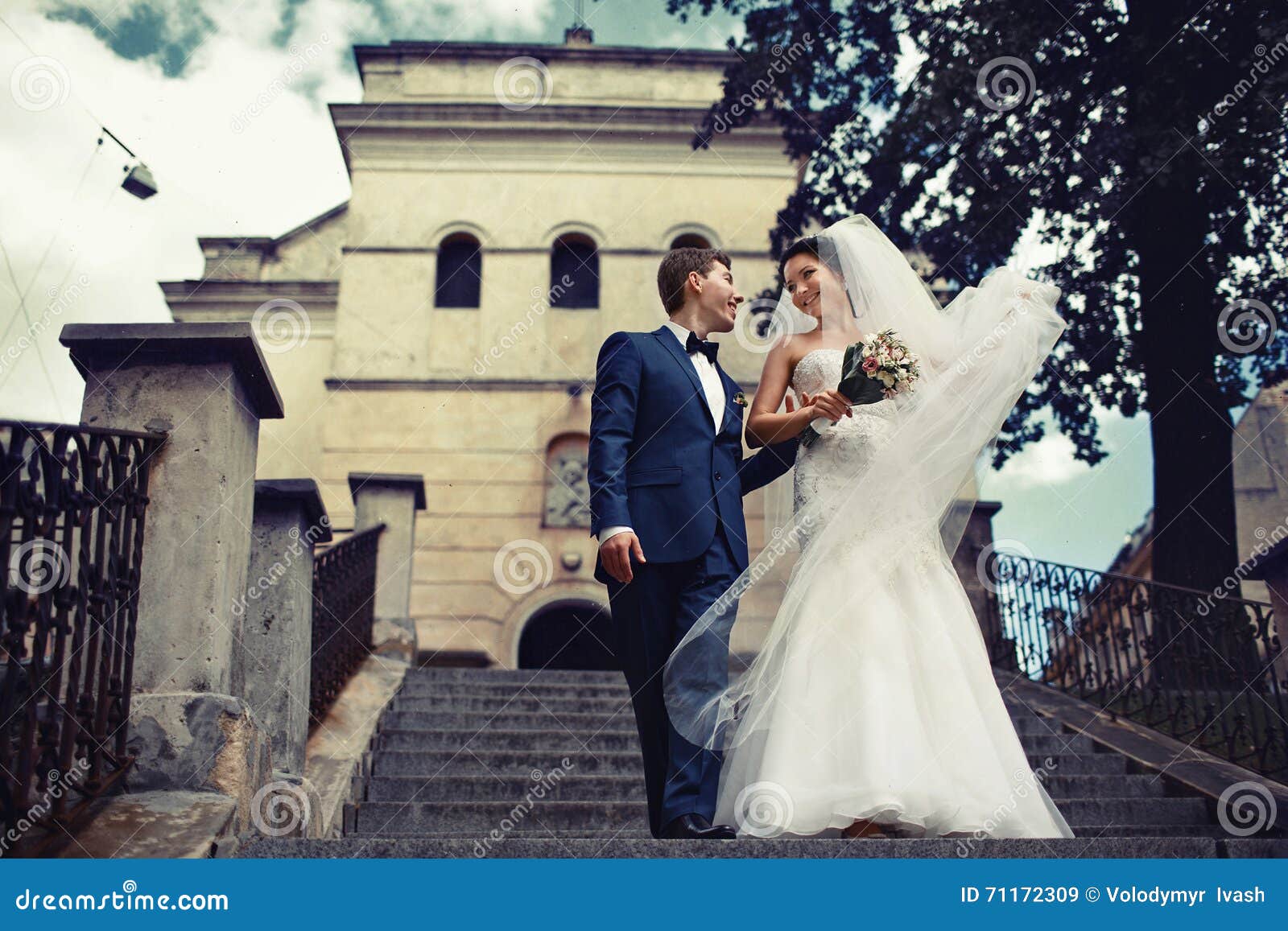 Happy Bride and Groom Come Down from a Church Stock Image - Image of ...