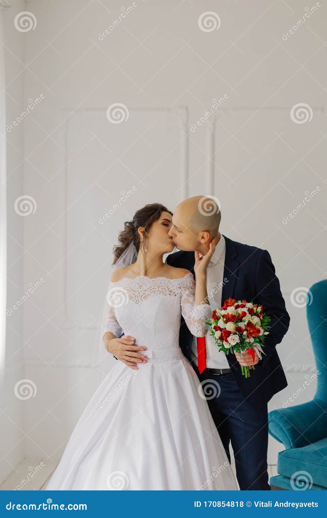Happy Bride and Groom in a Room Hug Each Other. Stock Photo - Image of ...