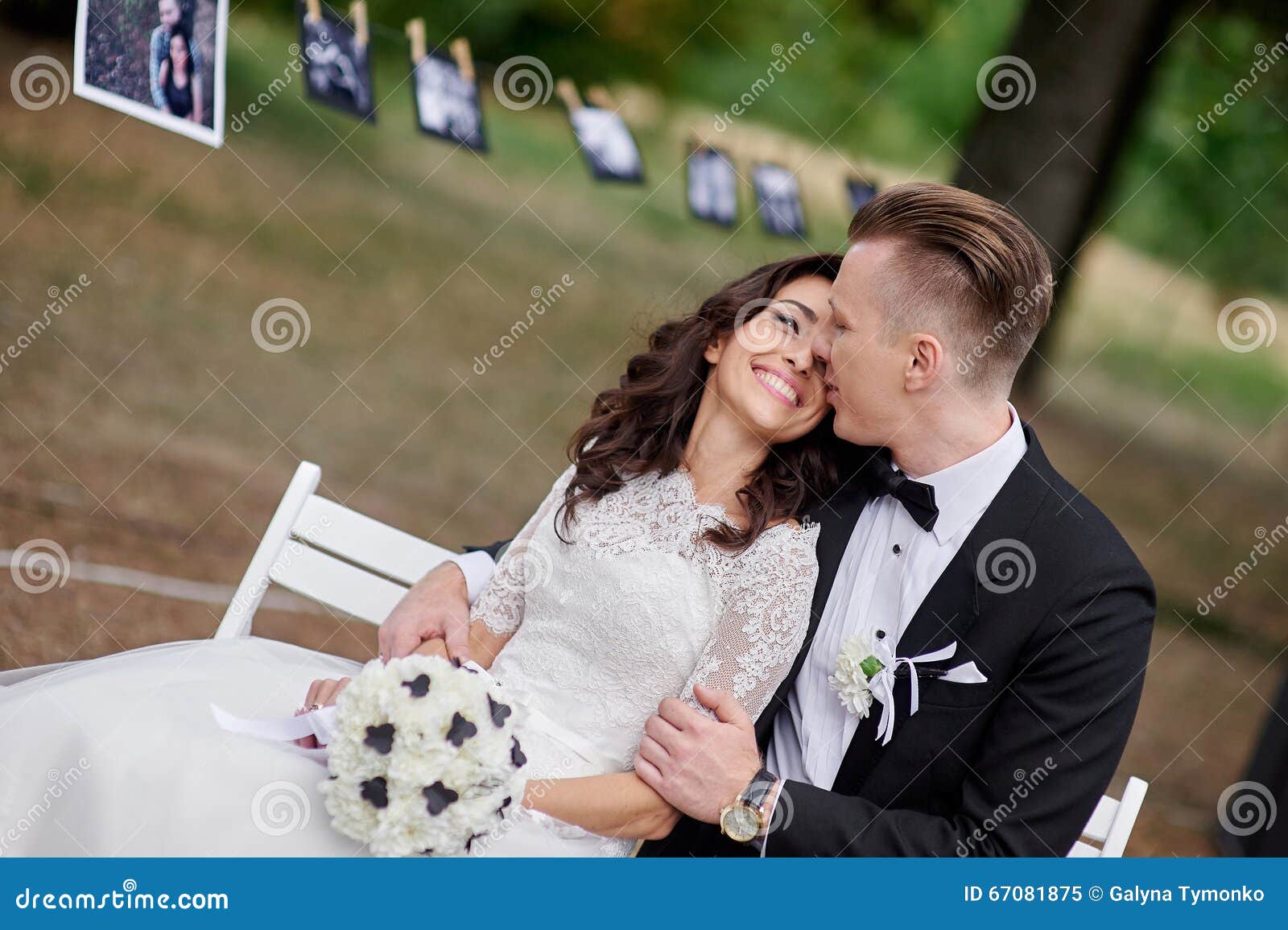 Happy Bride and Groom Sitting on Bench in the Park Stock Image - Image ...