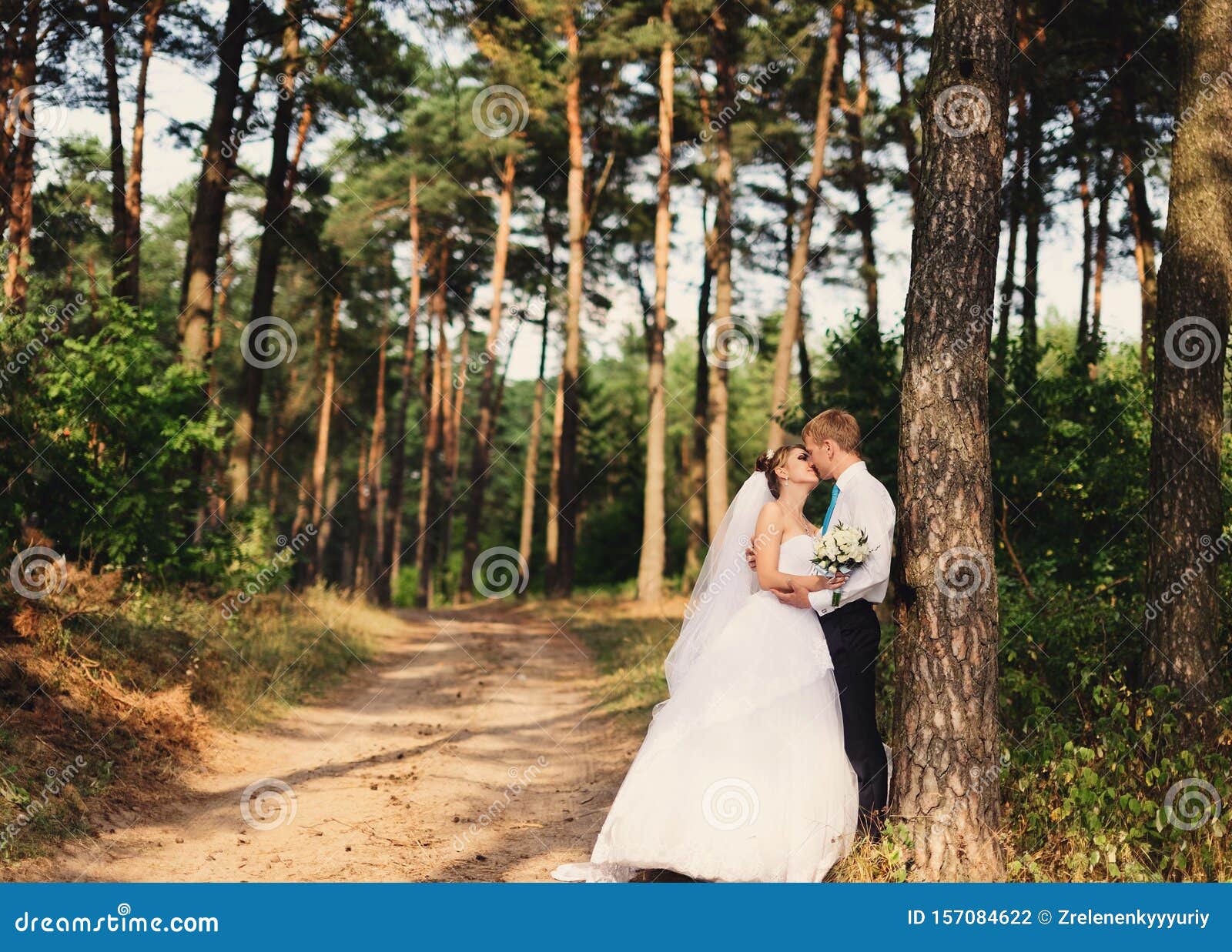 Happy Bride and Groom in the Forest. Wedding Stock Photo - Image of ...