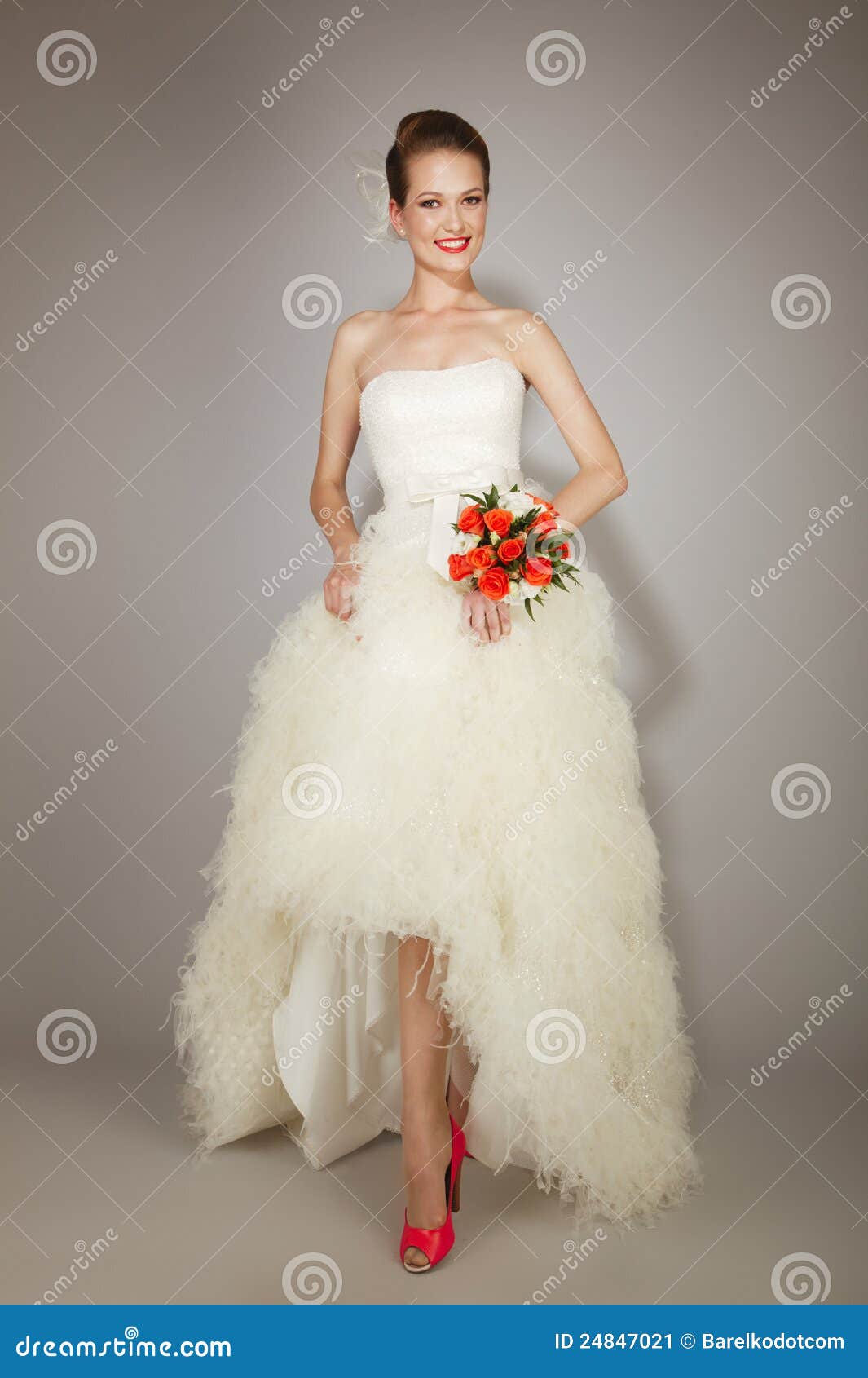 Happy bride holding heel stock image. Image of formal - 24847021