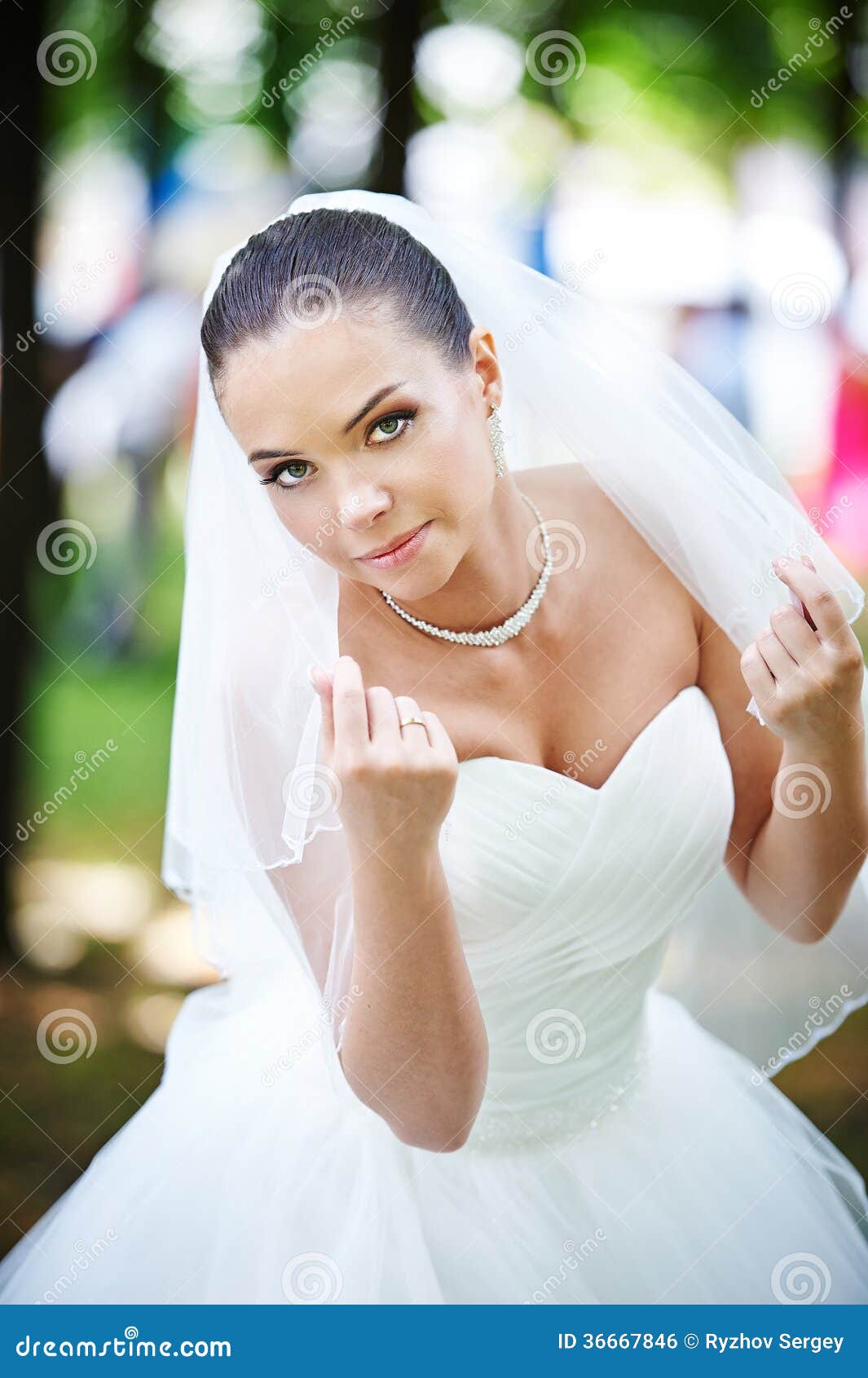 Happy bride keeps veil stock photo. Image of brunette - 36667846
