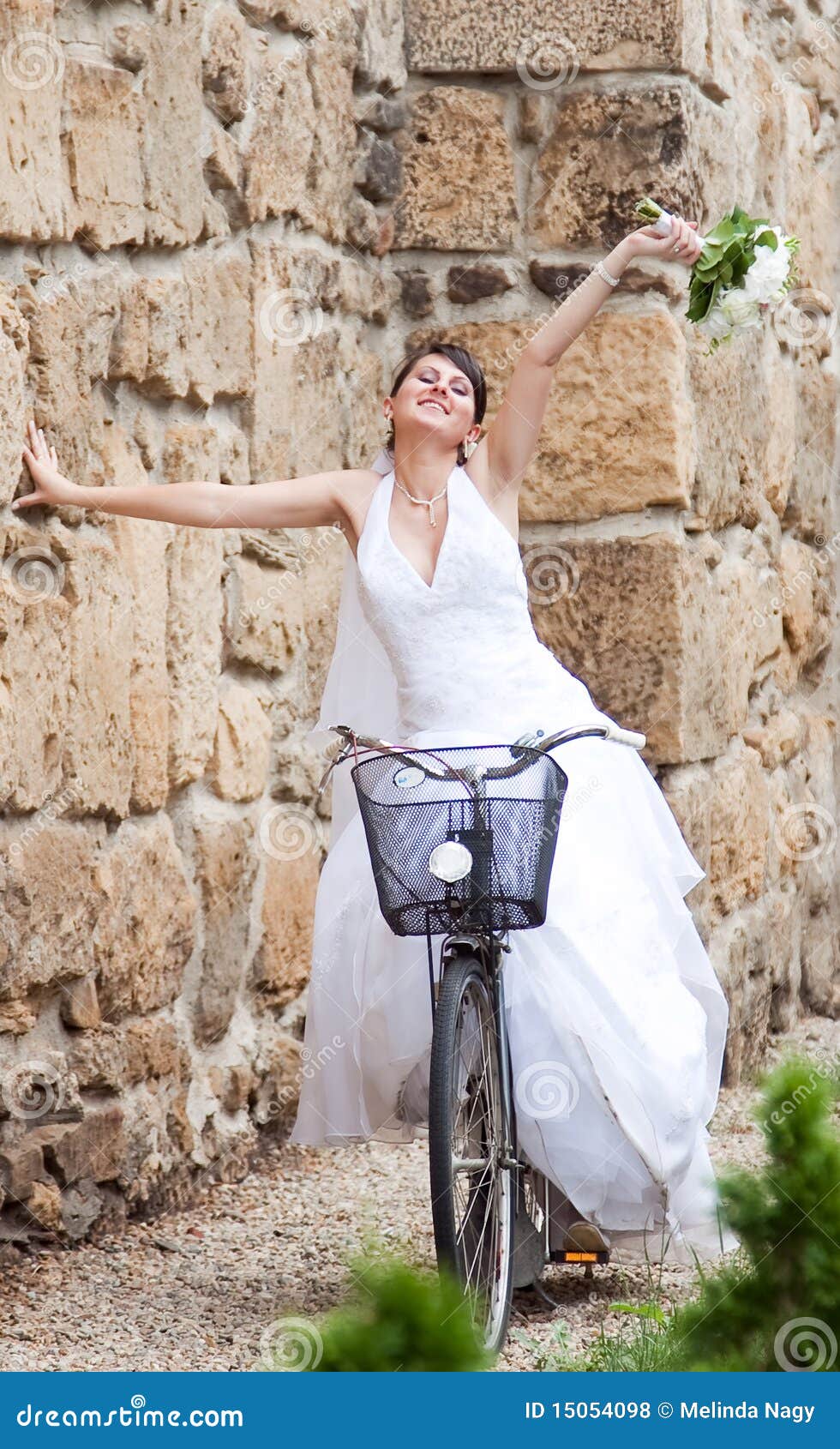 Happy Bride Riding A Bike Picture. Image: 15054098