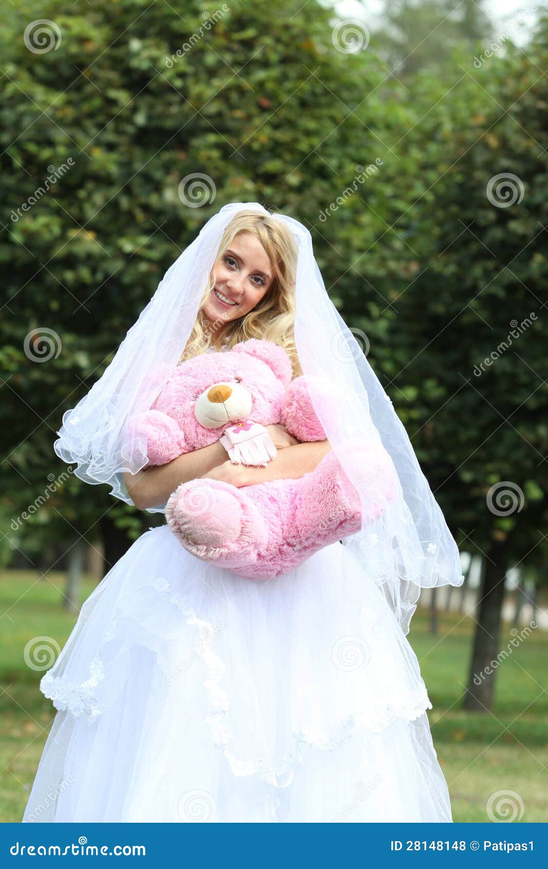 Happy bride with toy stock photo. Image of cheerful, pretty - 28148148