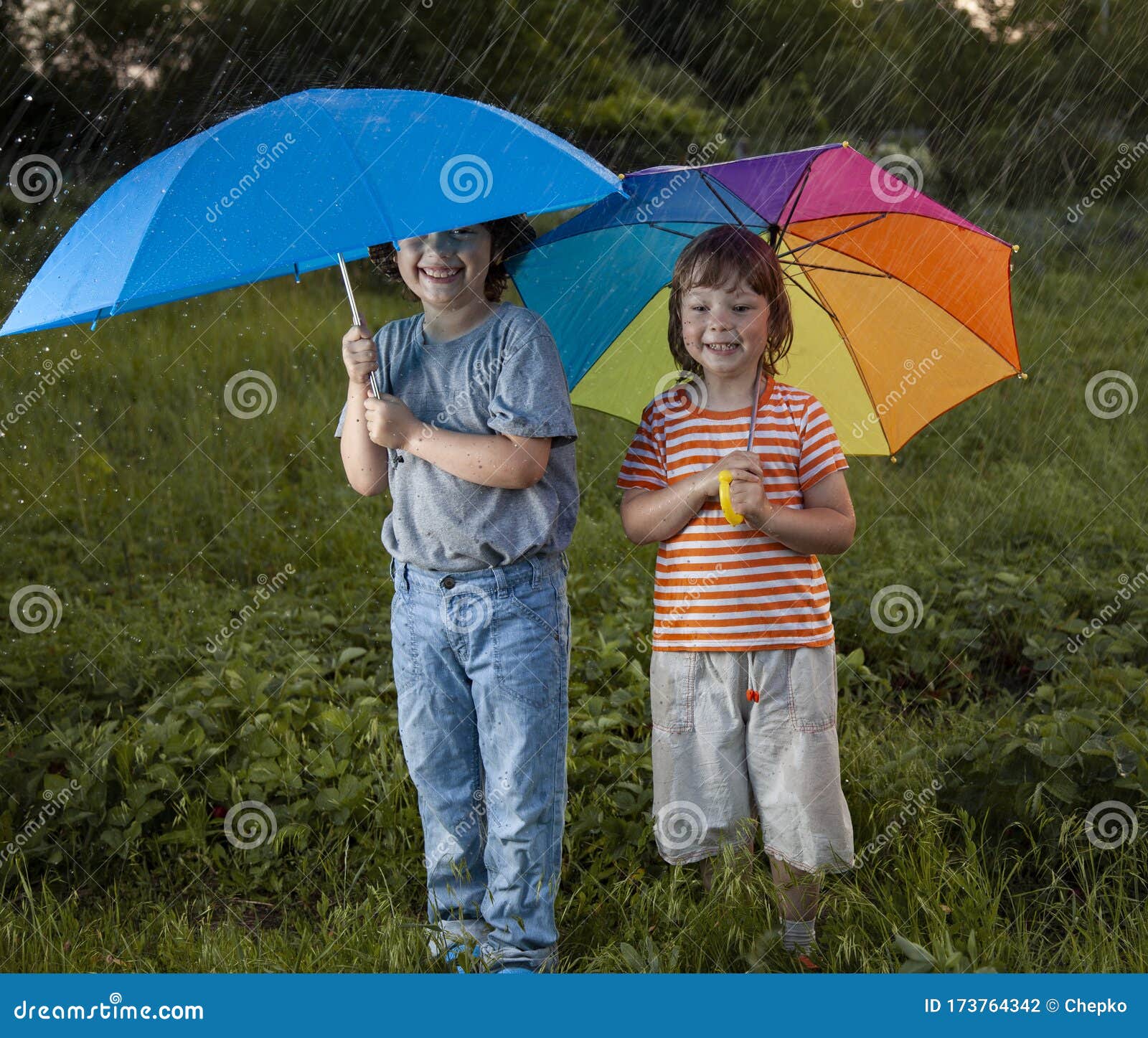 Happy Brother with Umbrella Outdoors Stock Photo - Image of brothers ...