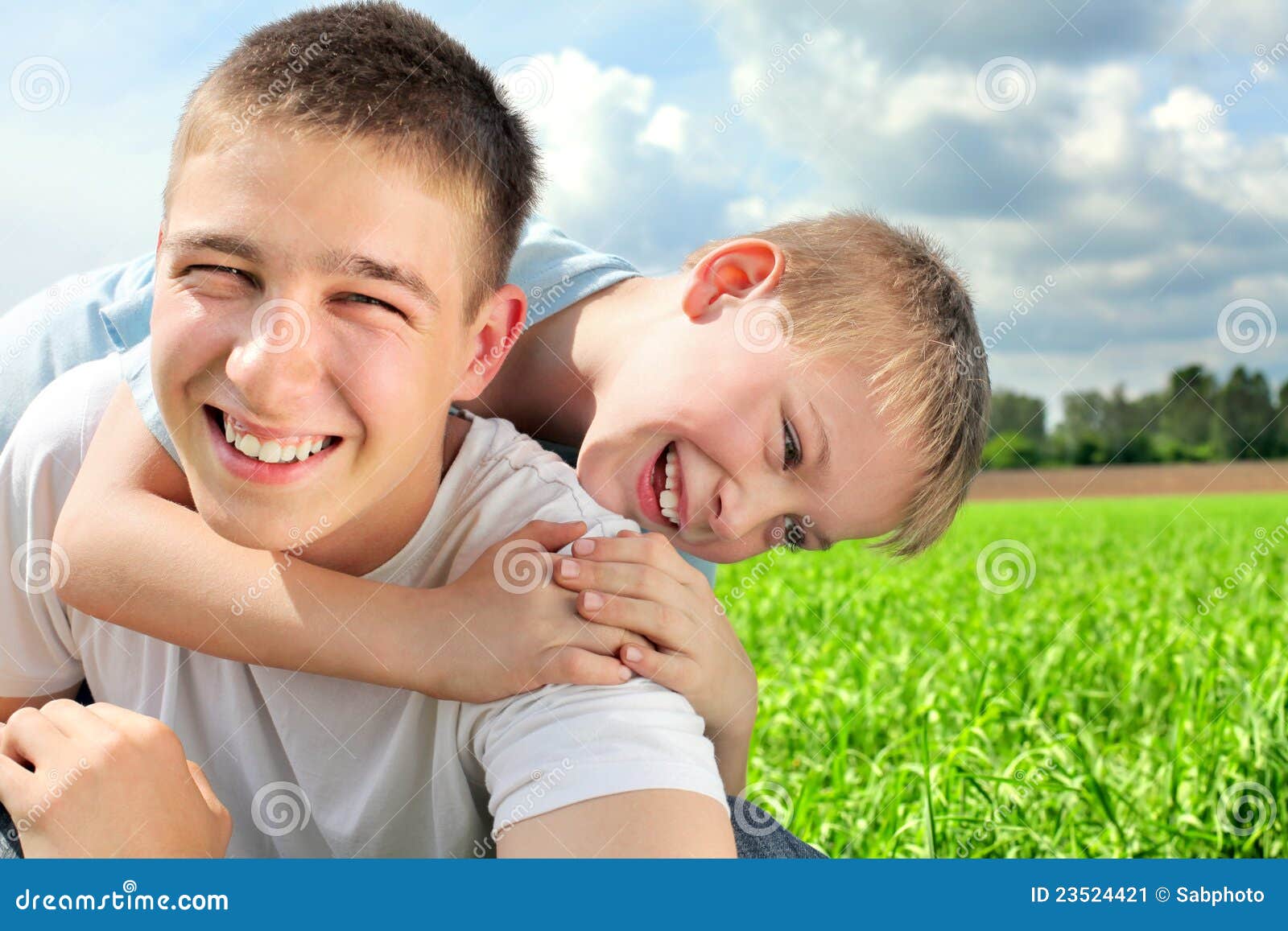 Happy brothers stock image. Image of grass, adolescence - 23524421