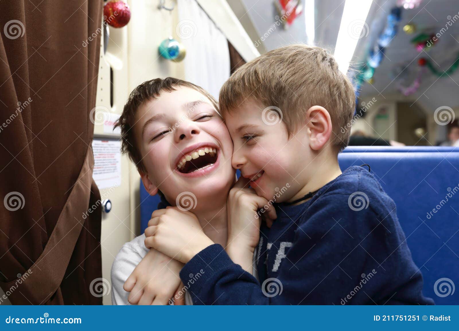 Happy brothers hugging stock image. Image of expression - 211751251