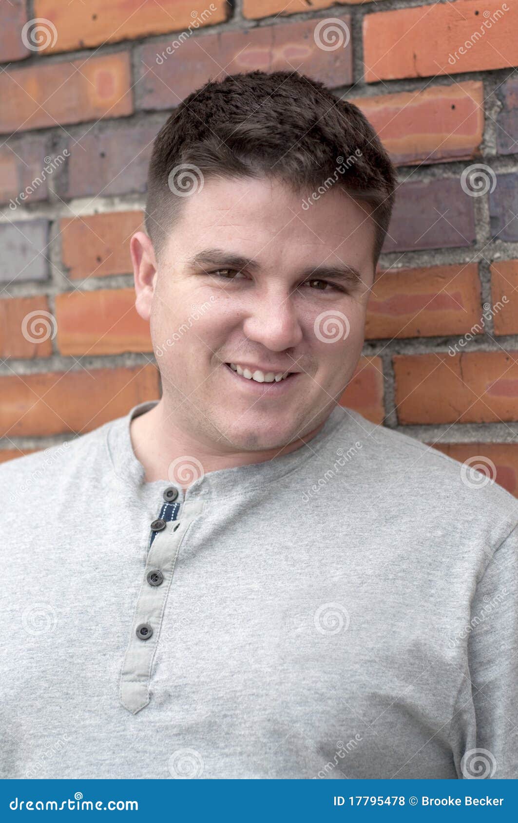Happy Brown Haired Caucasian Man Stock Photo - Image of crooked, brick ...