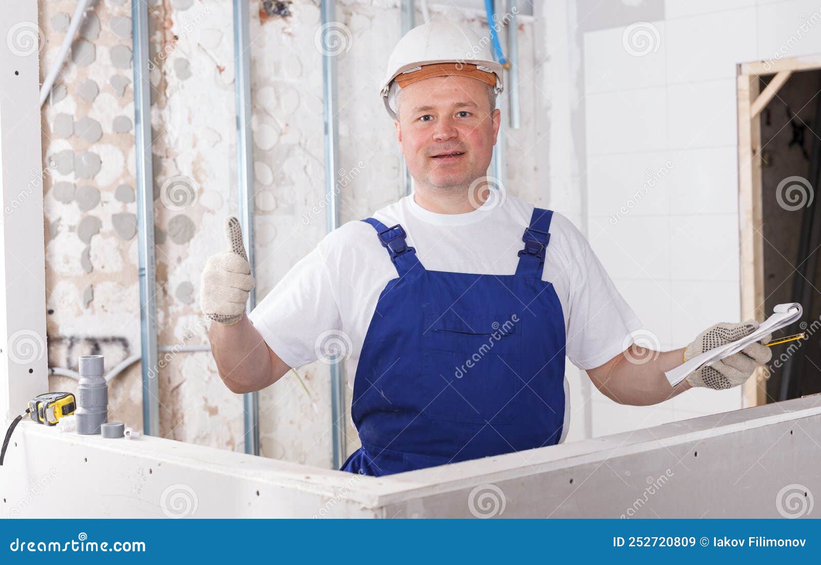 Happy builder stock image. Image of gesturing, overhauls - 252720809