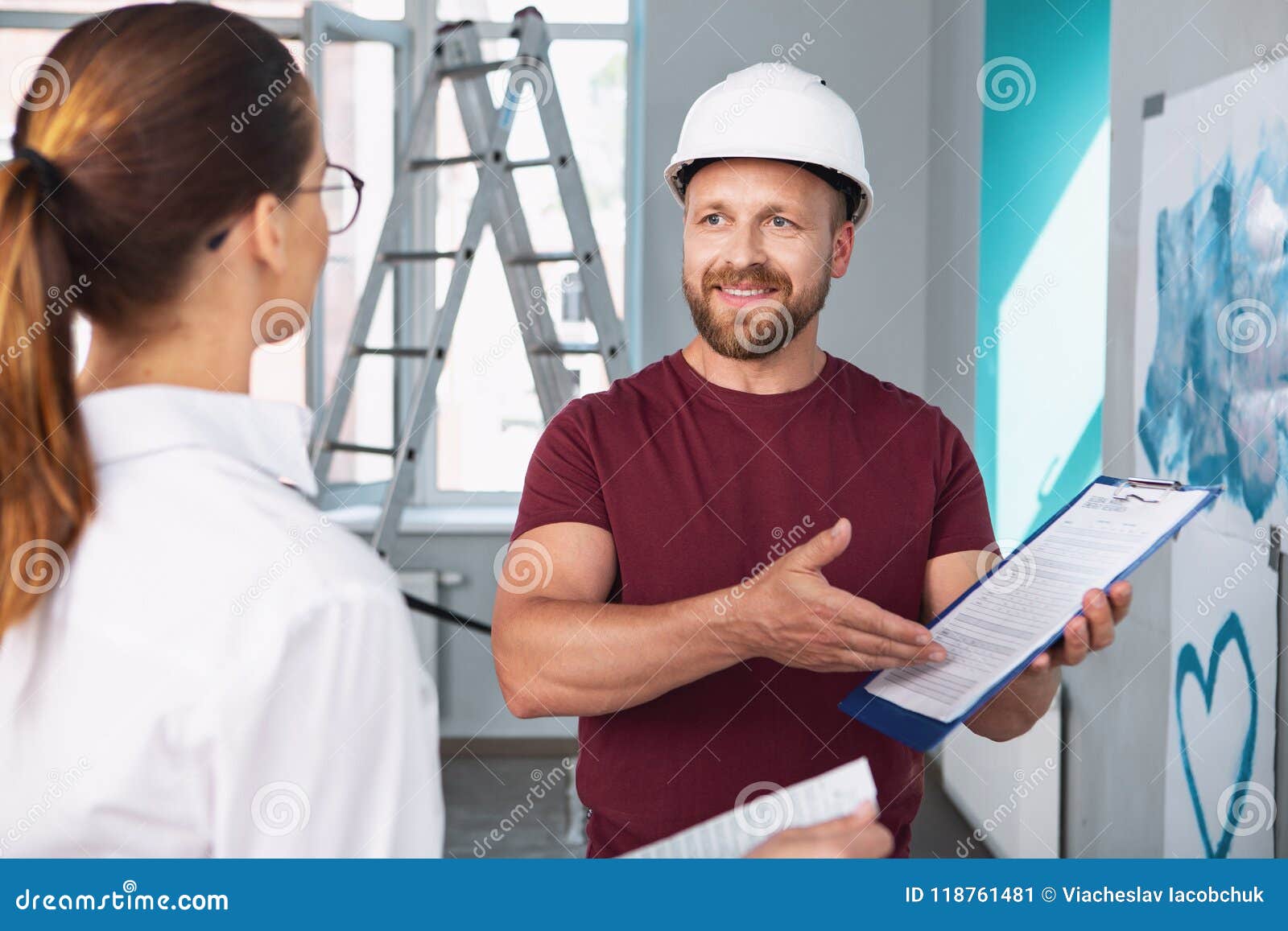 Happy Builder Showing the Contract To His Client Stock Image - Image of ...