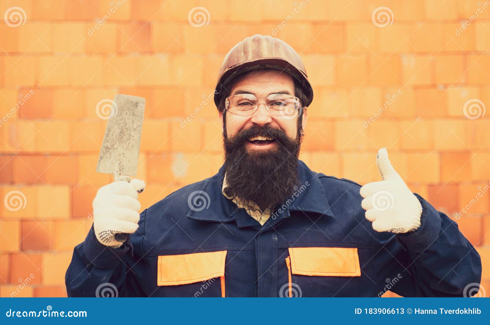 Happy Builder Worker. Cheerful Man with a Smile at a Construction Site ...
