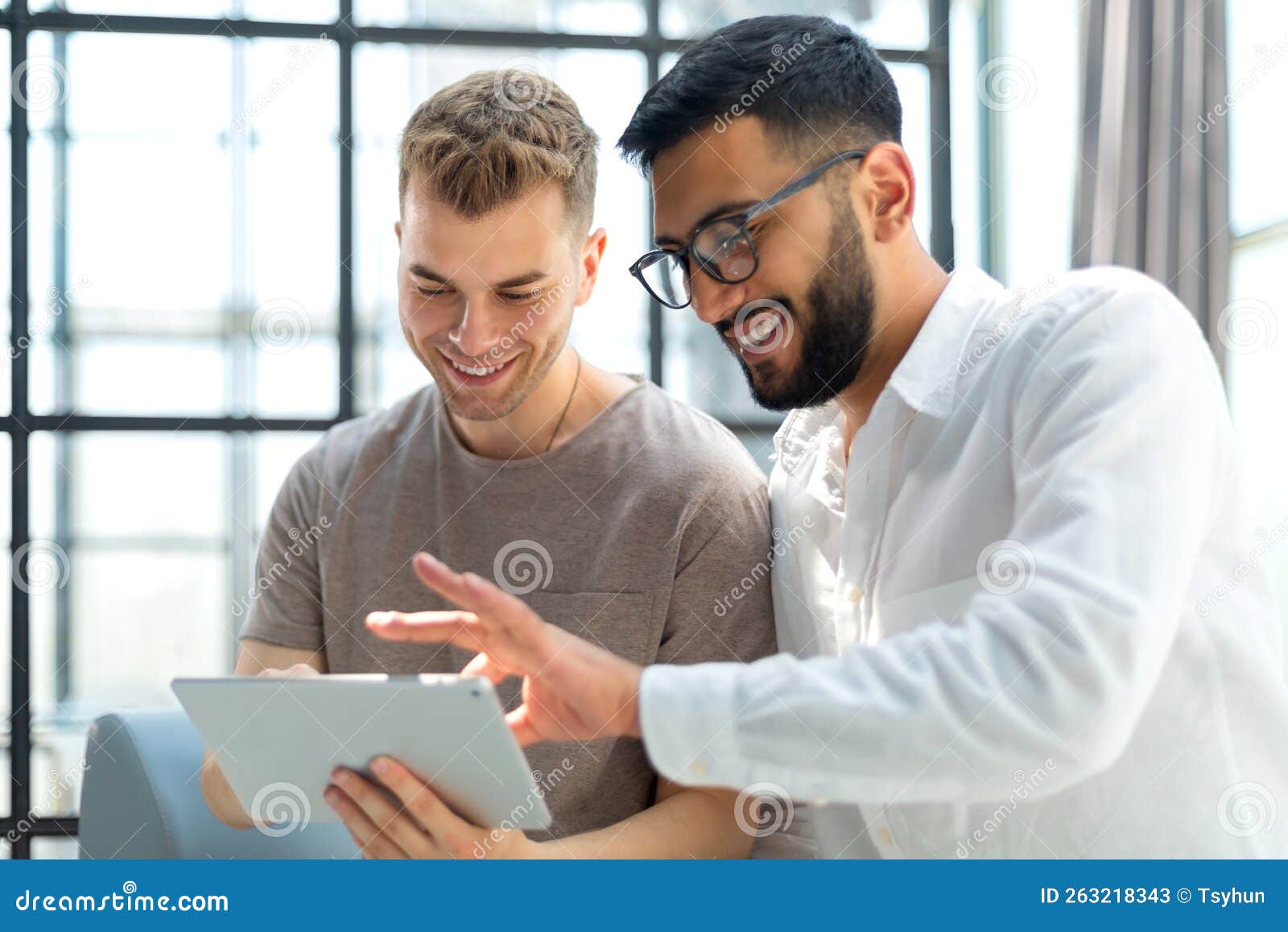Happy Business Colleagues in Modern Office Using Tablet Stock Image ...