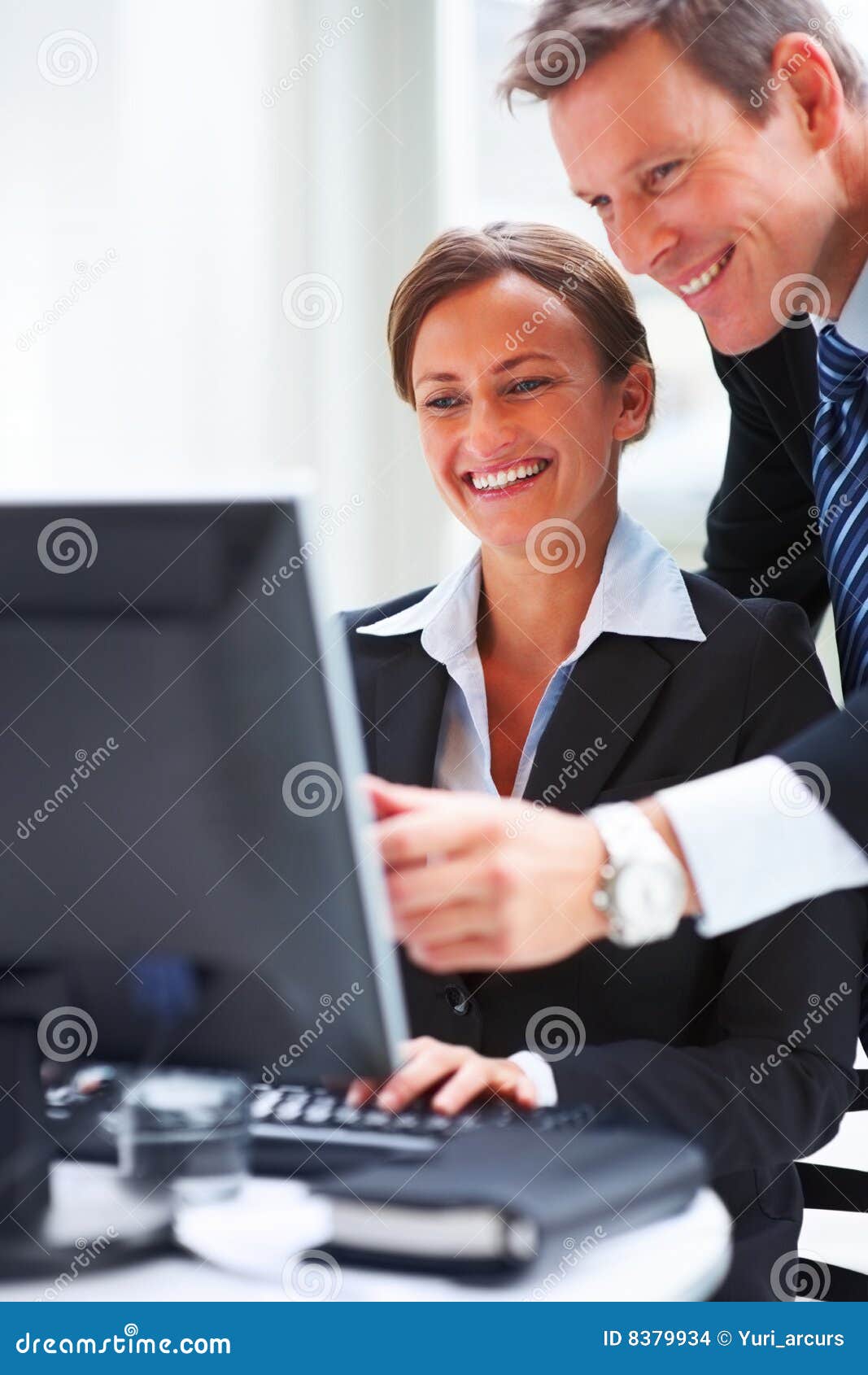 Happy Business Colleagues Working on Laptop Stock Photo - Image of ...