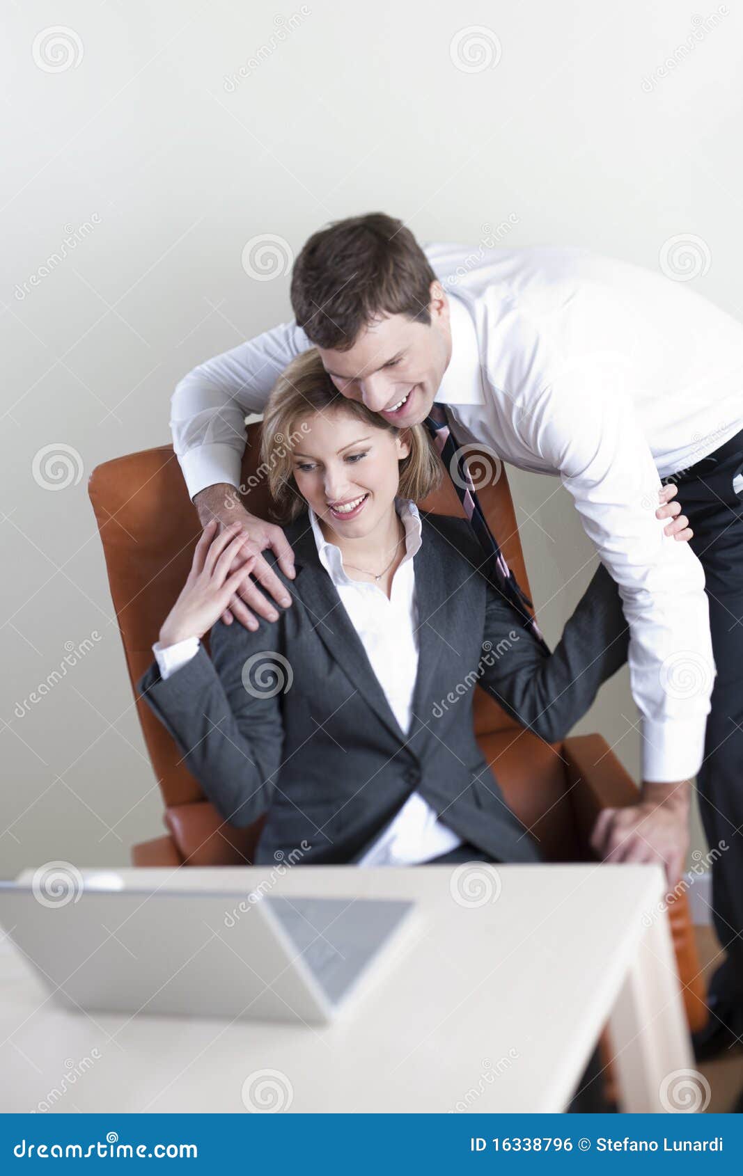 Happy business couple stock photo. Image of brown, male - 16338796