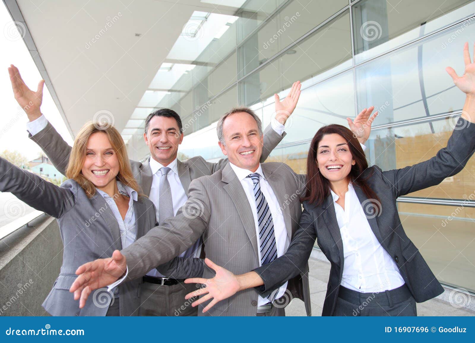 Happy business group stock photo. Image of motivated - 16907696